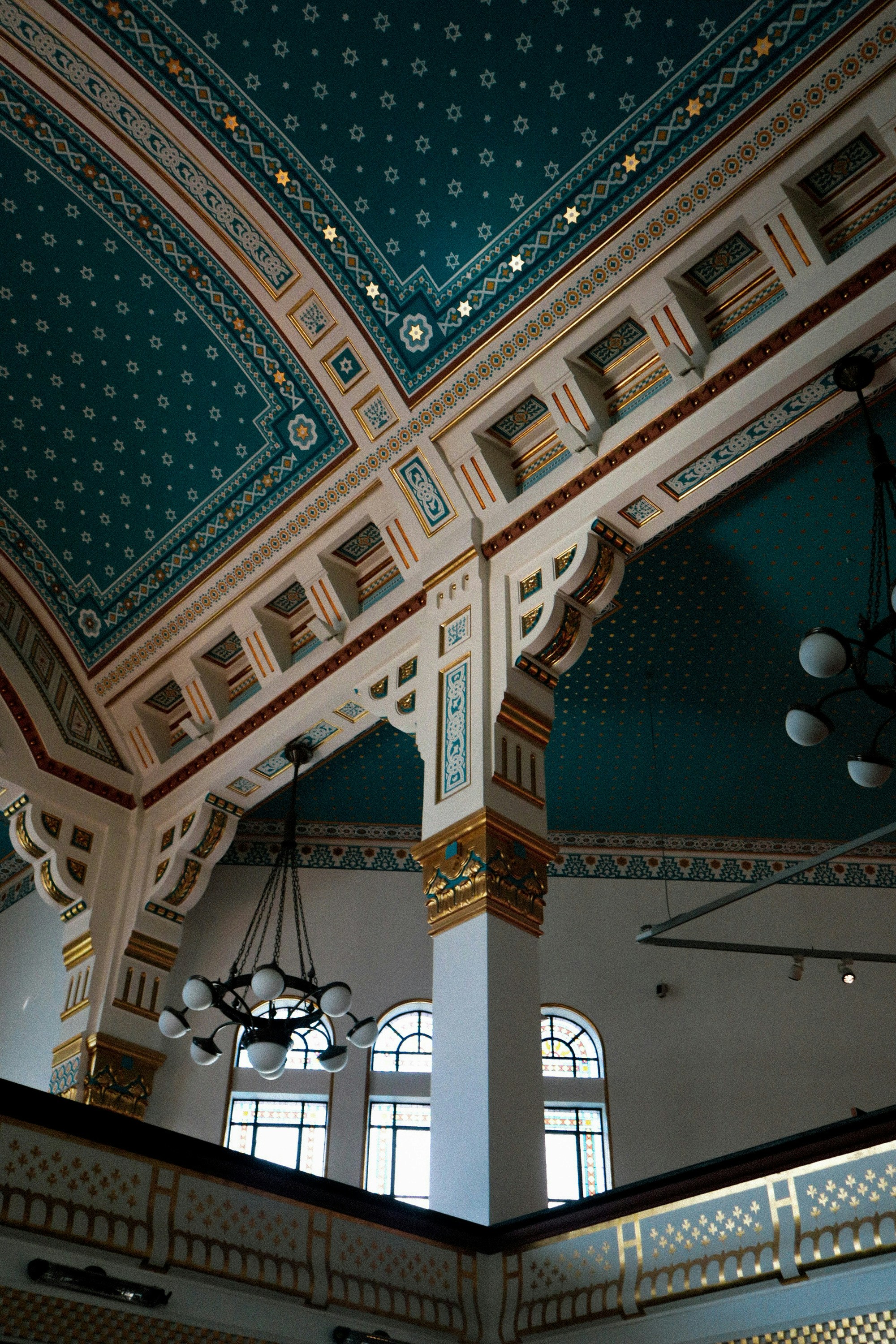 Blue Vaults and Golden Lattices: A Grand Interior of Arches and Light