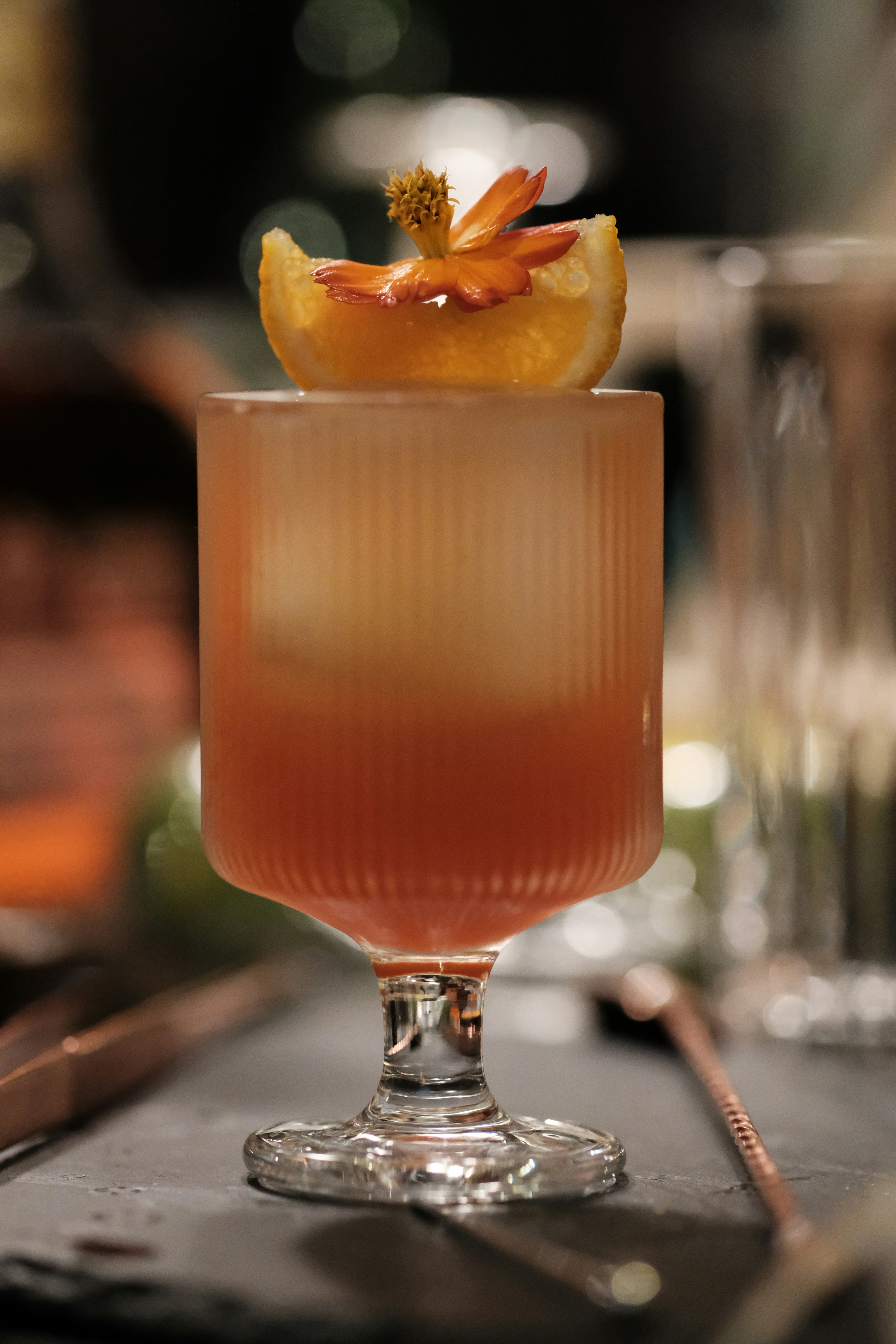 Citrus Crown on a Sunset-Gradient Cocktail