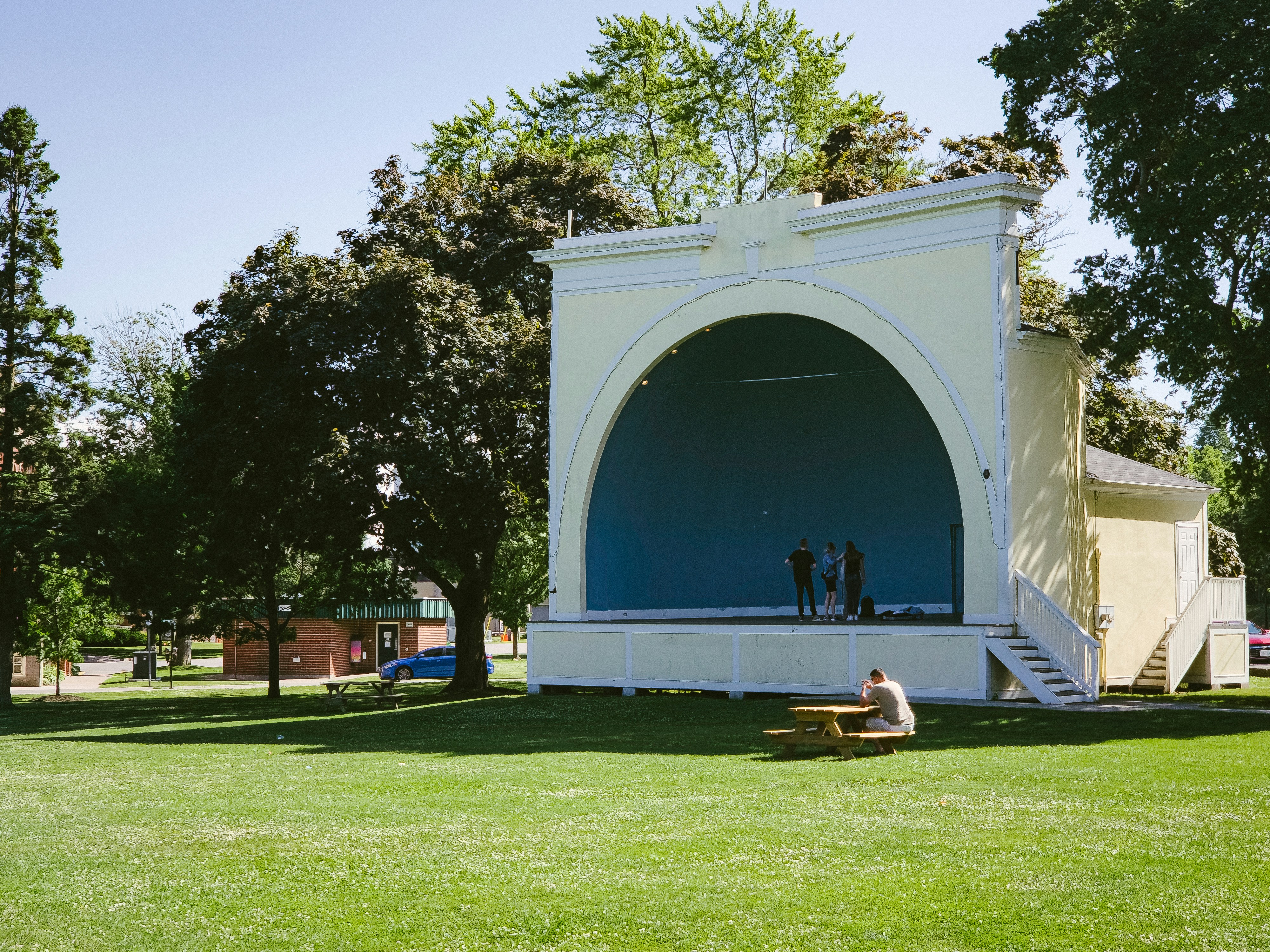 Blue-Arch Band Shell in a Sunlit Park