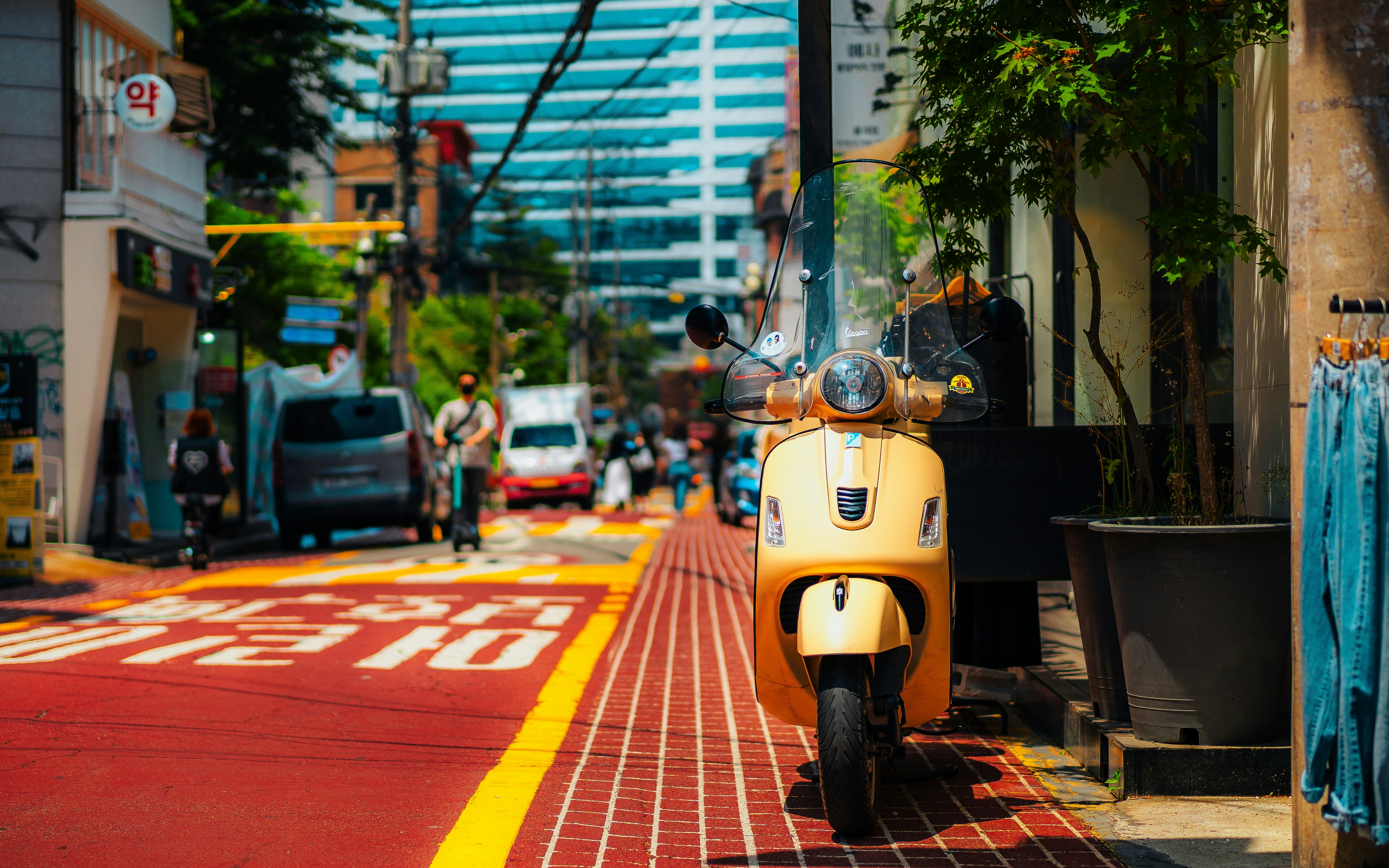 A motor scooter parked on the side of the road photo – Free Seoul Image ...