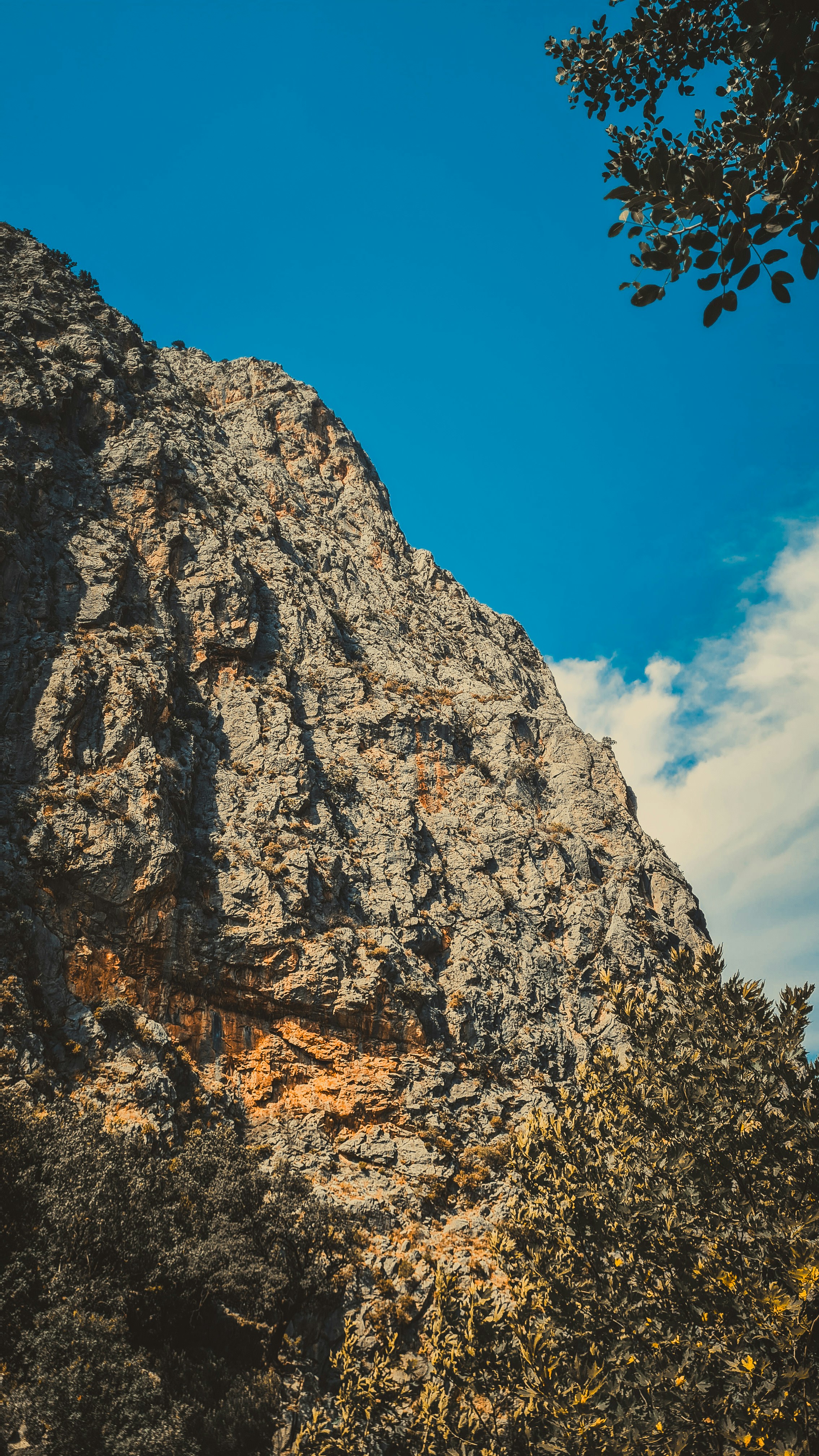A large rock with a sky in the background photo – Free Rock Image on ...