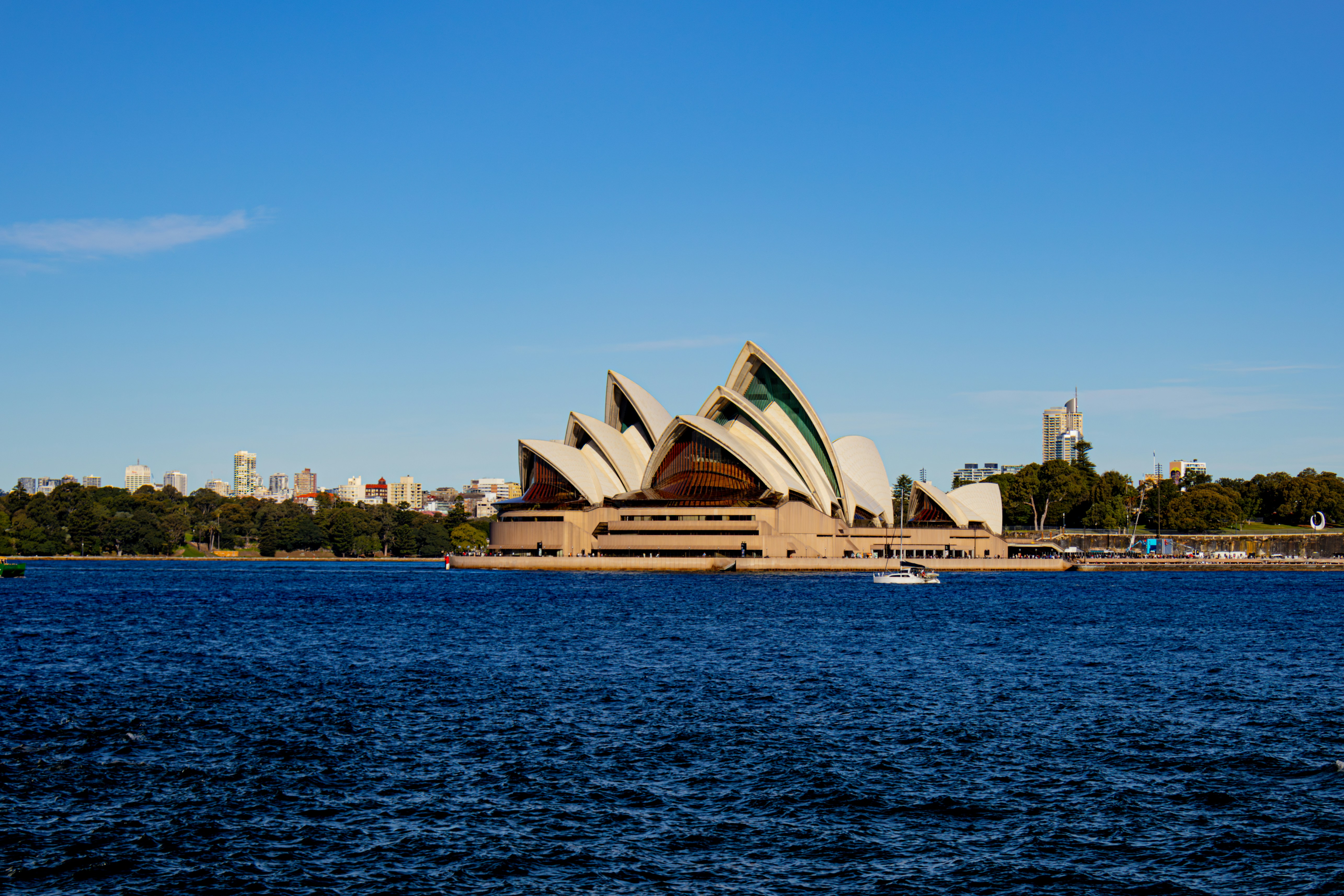 A view of the sydney opera house from across the water photo – Free ...