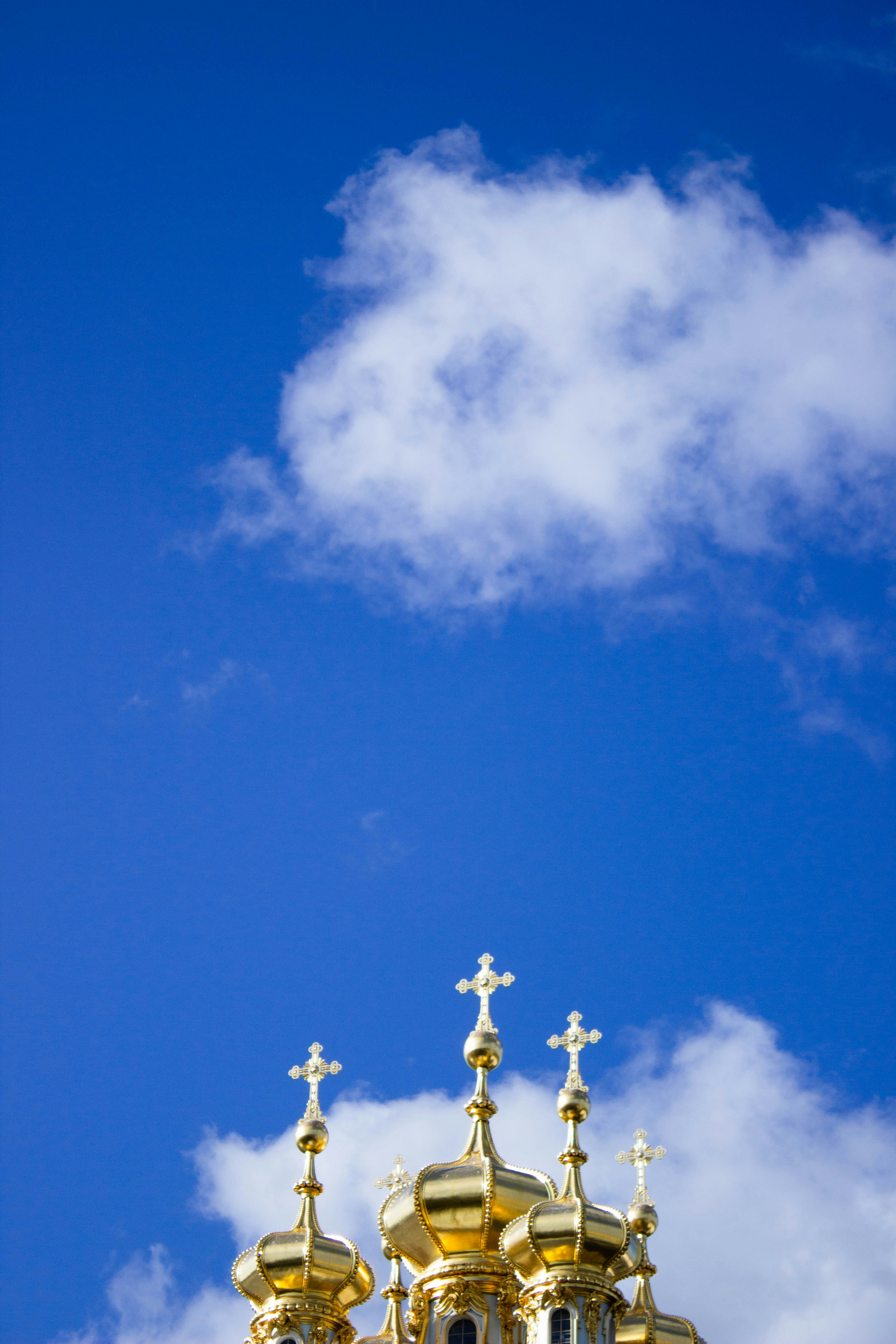 Golden onion domes crowned against ultramarine sky