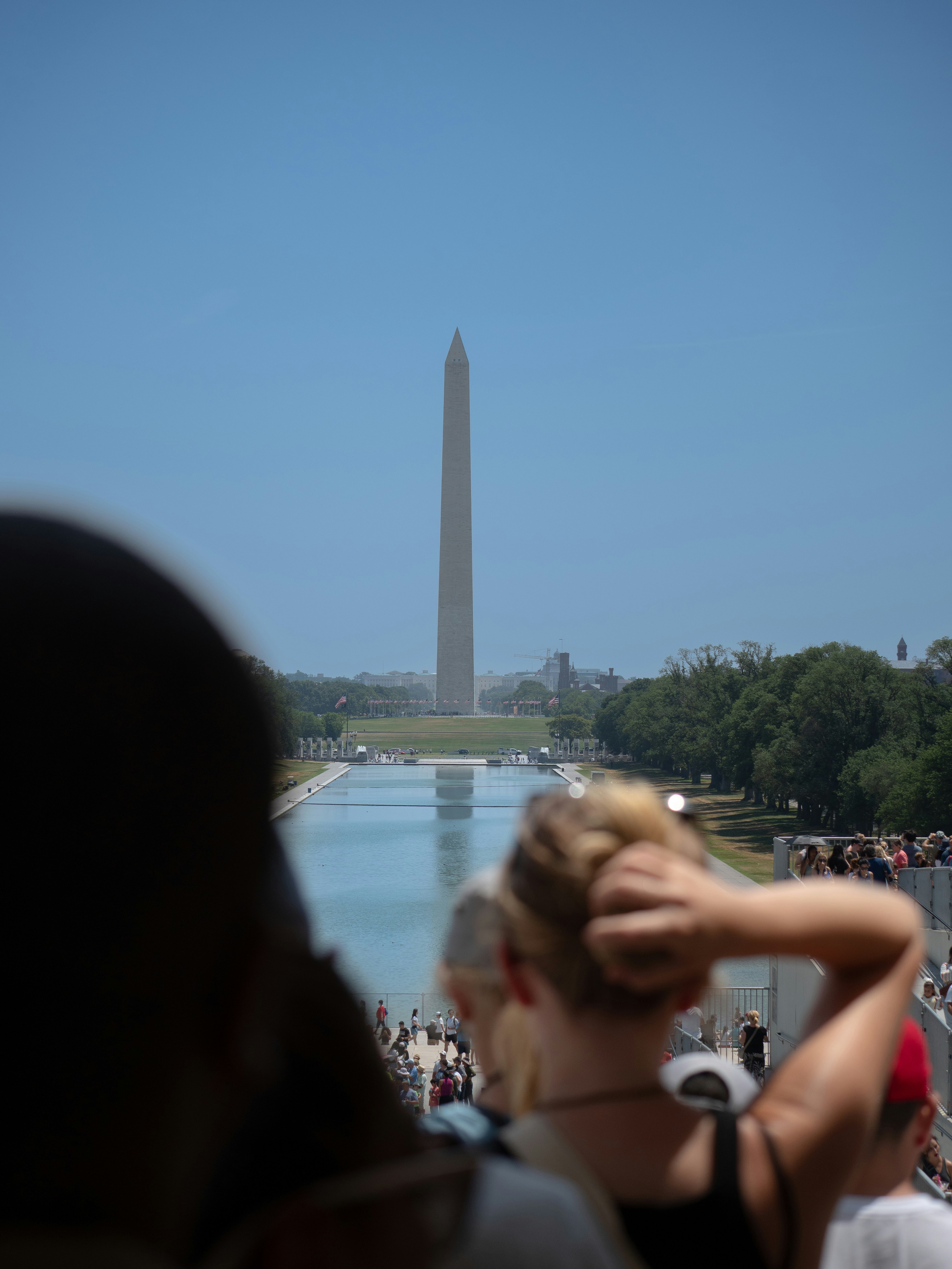 Monolith on the Mall: Washington Monument Rising Over the Reflecting Pool in Bright Daylight