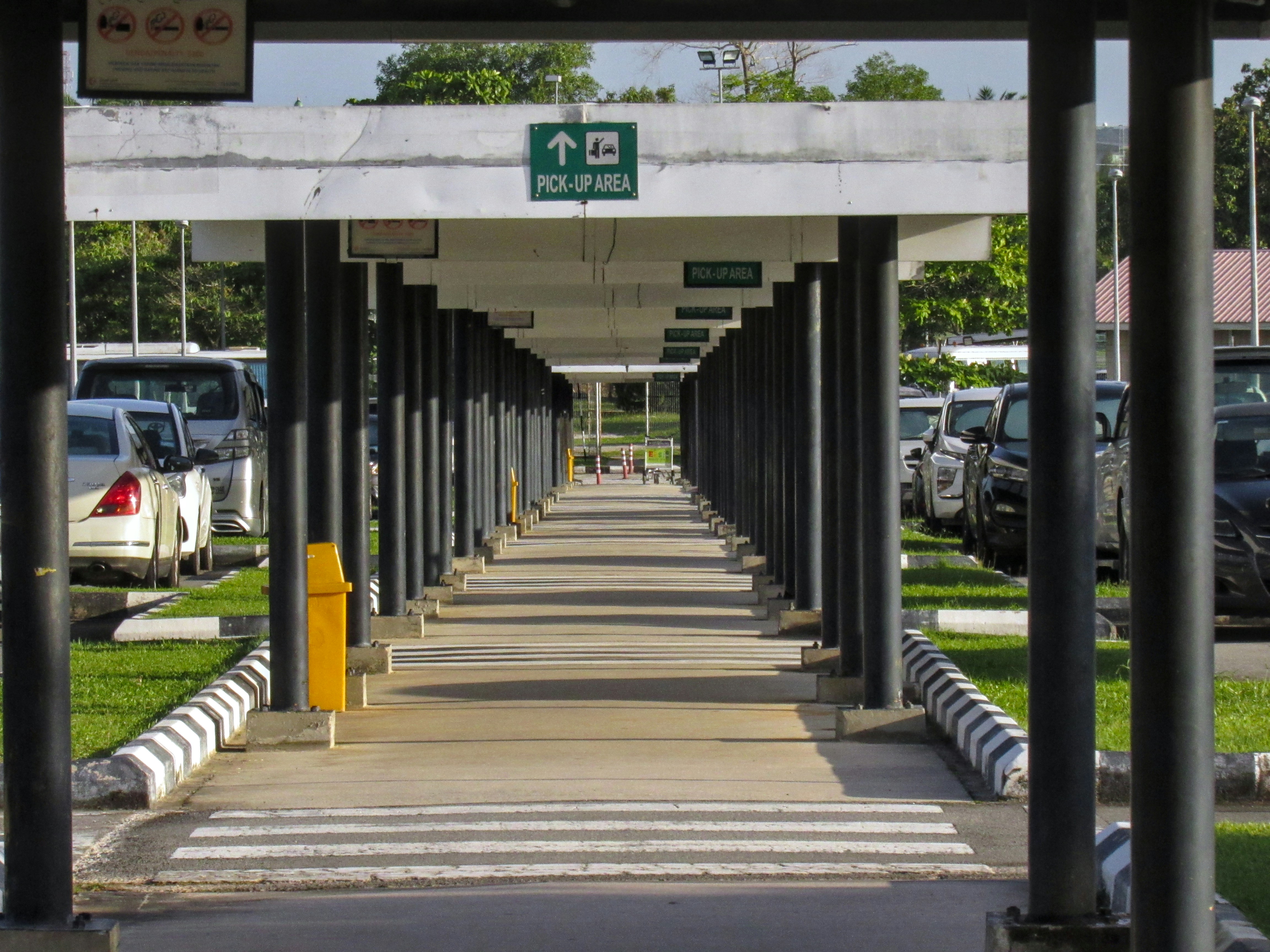 Vanishing Aisle: Perspective Lines in a Parking Corridor