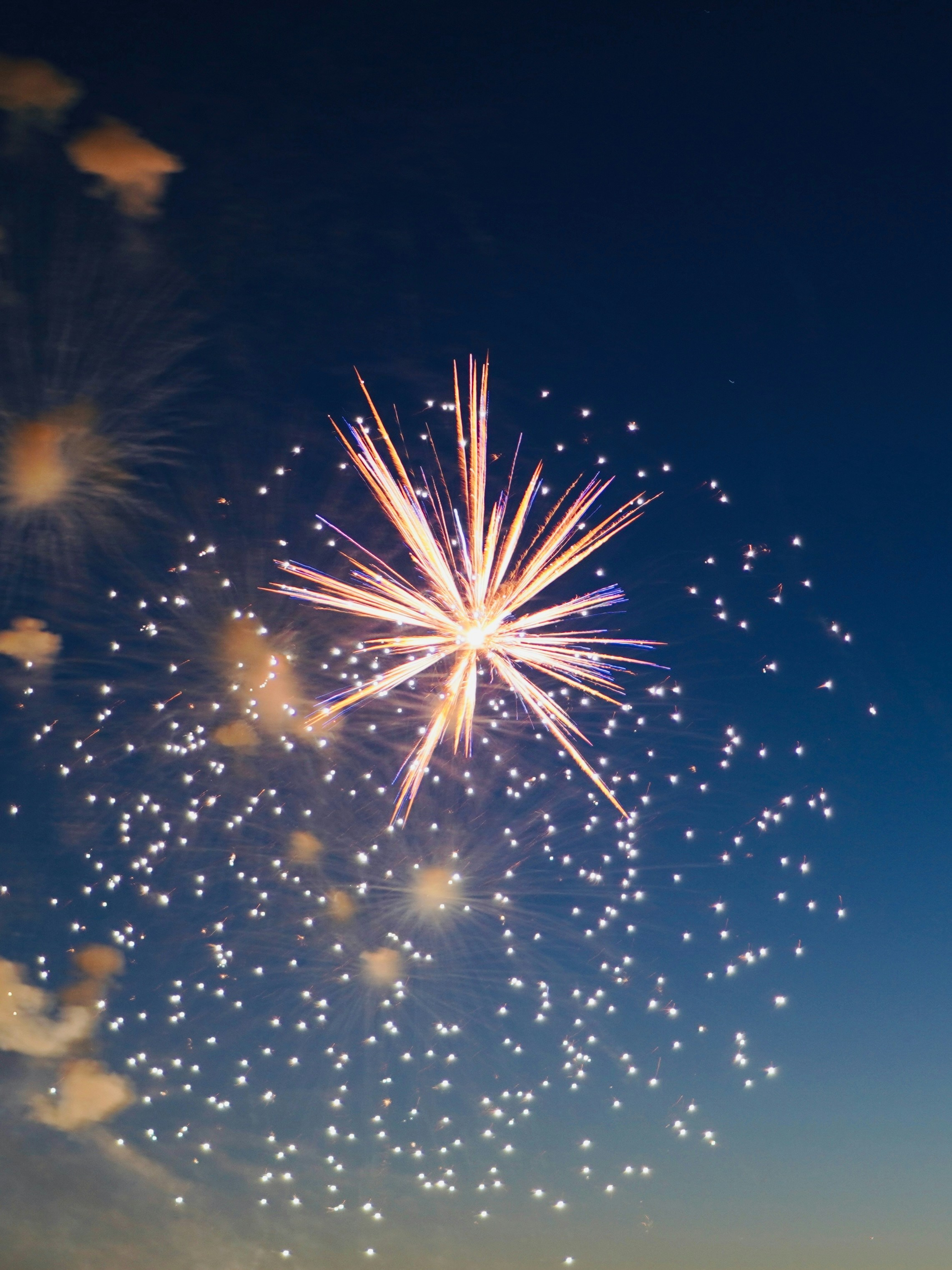 A large fireworks is lit up in the sky photo – Free Fireworks Image on ...