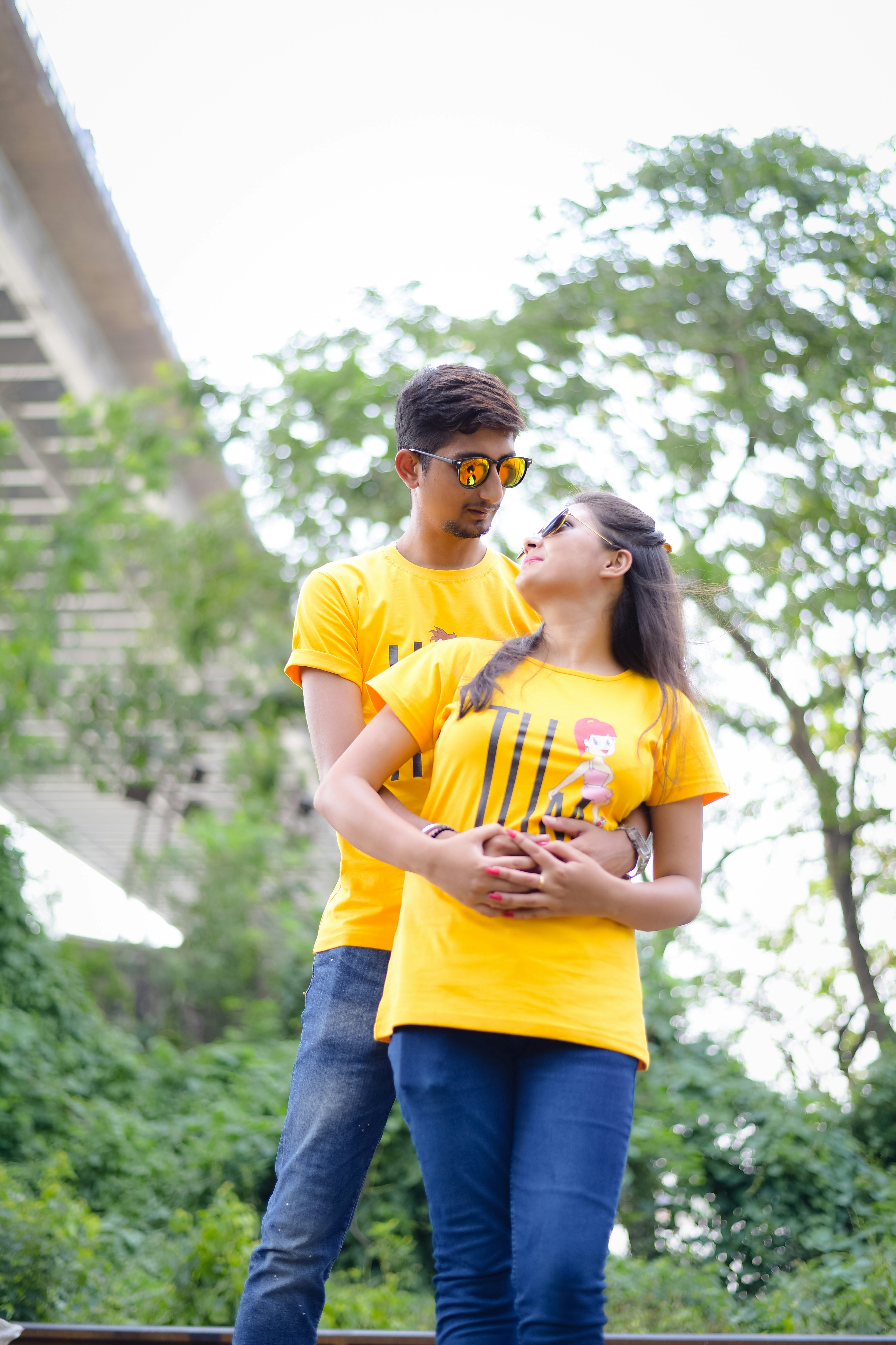 A man and a woman standing next to each other