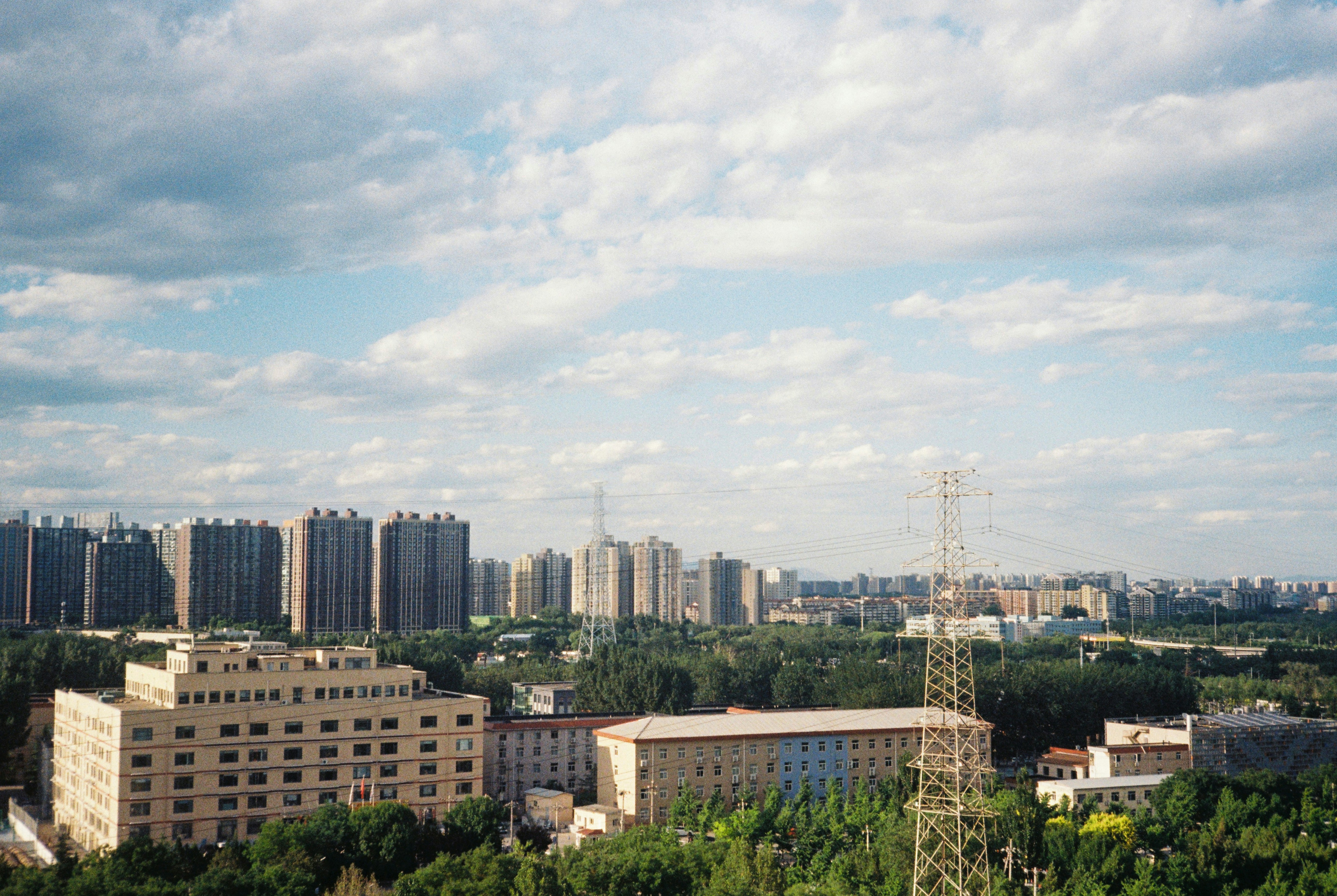 Urban Quilt: Mid-Rise Skyline Framed by Power Lines