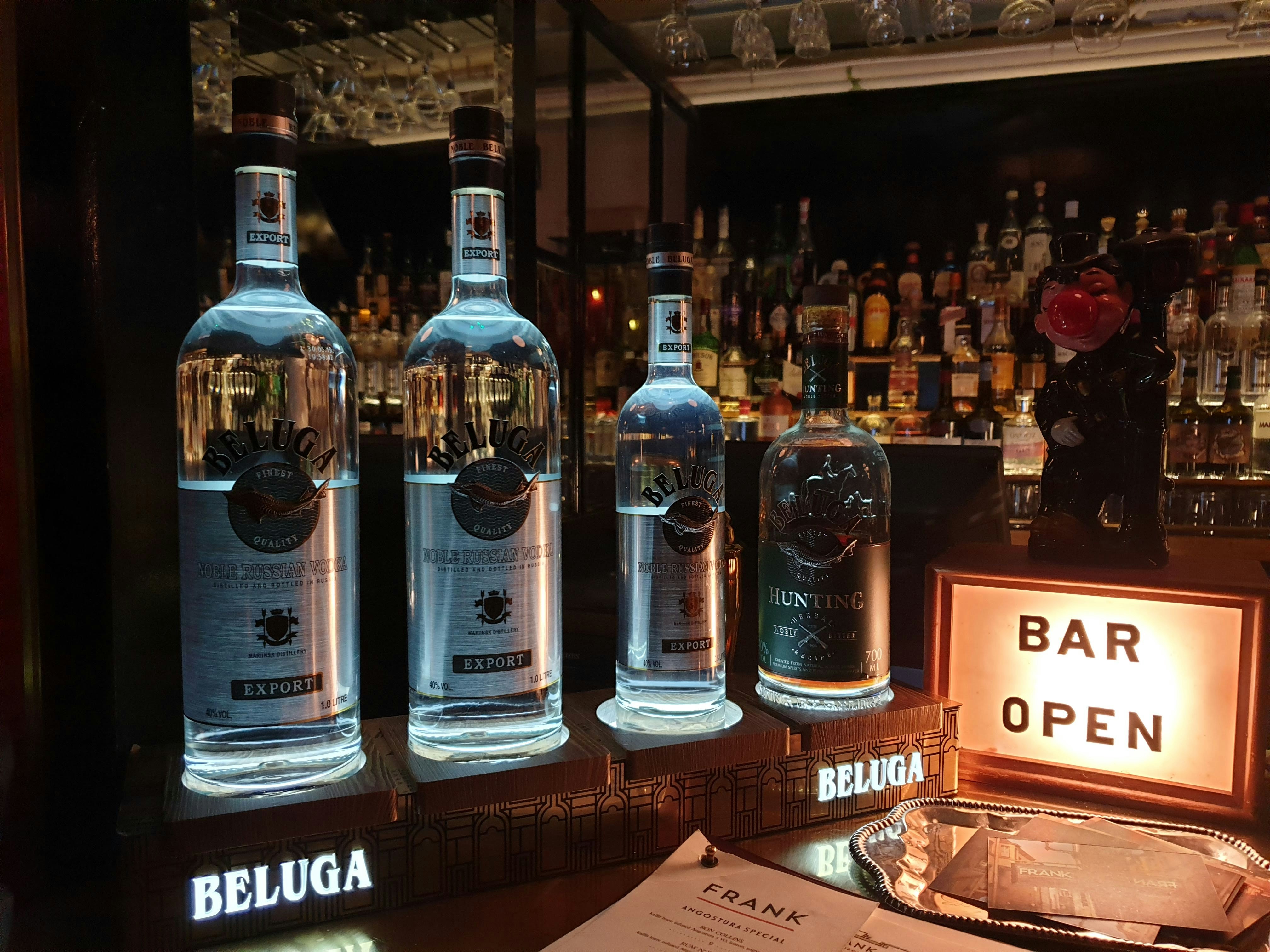 A bar with bottles of alcohol on the bar counter photo – Free Tallinn ...