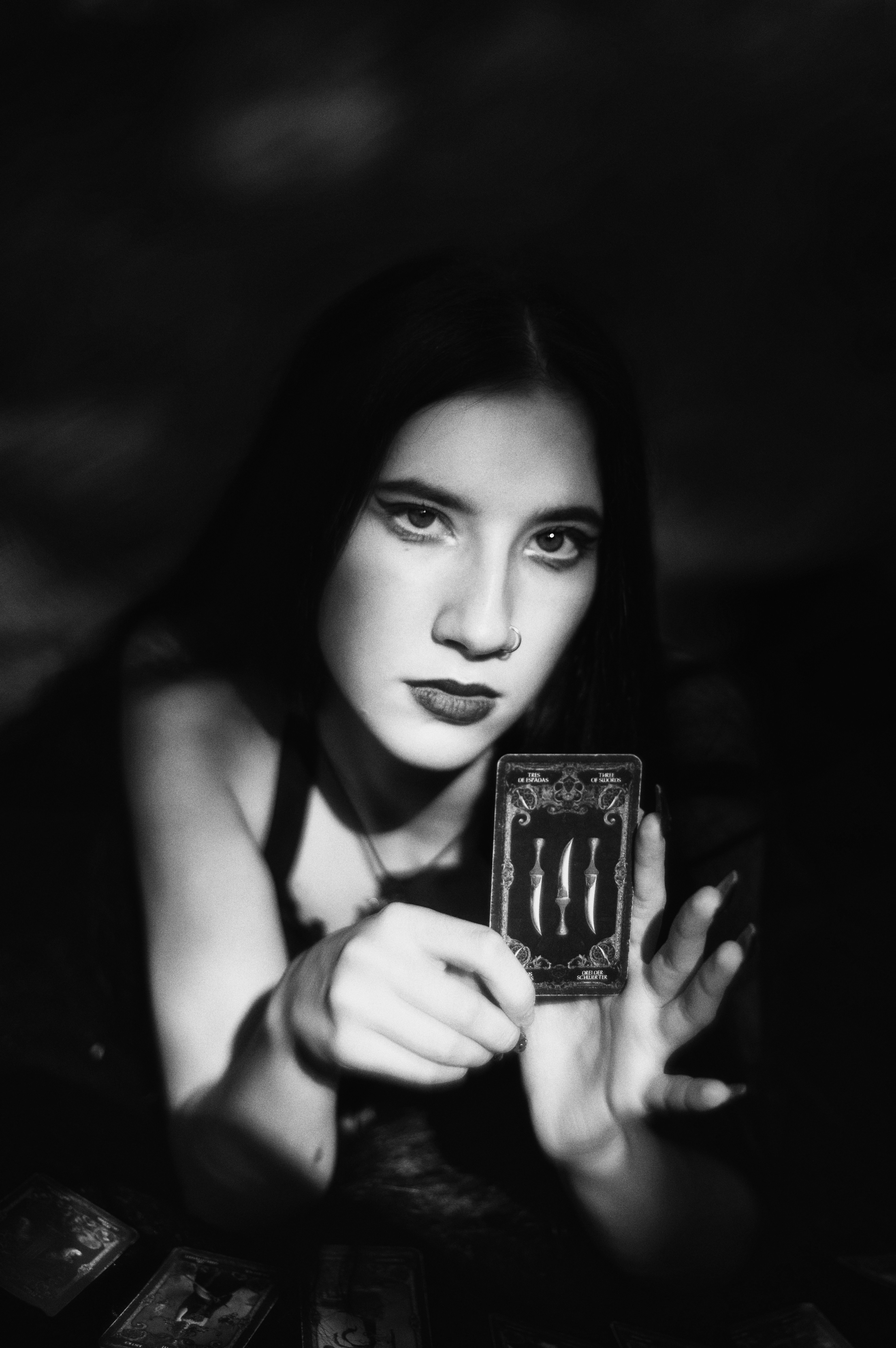 Noir Gaze: Portrait with a Tarot Card in Shadow