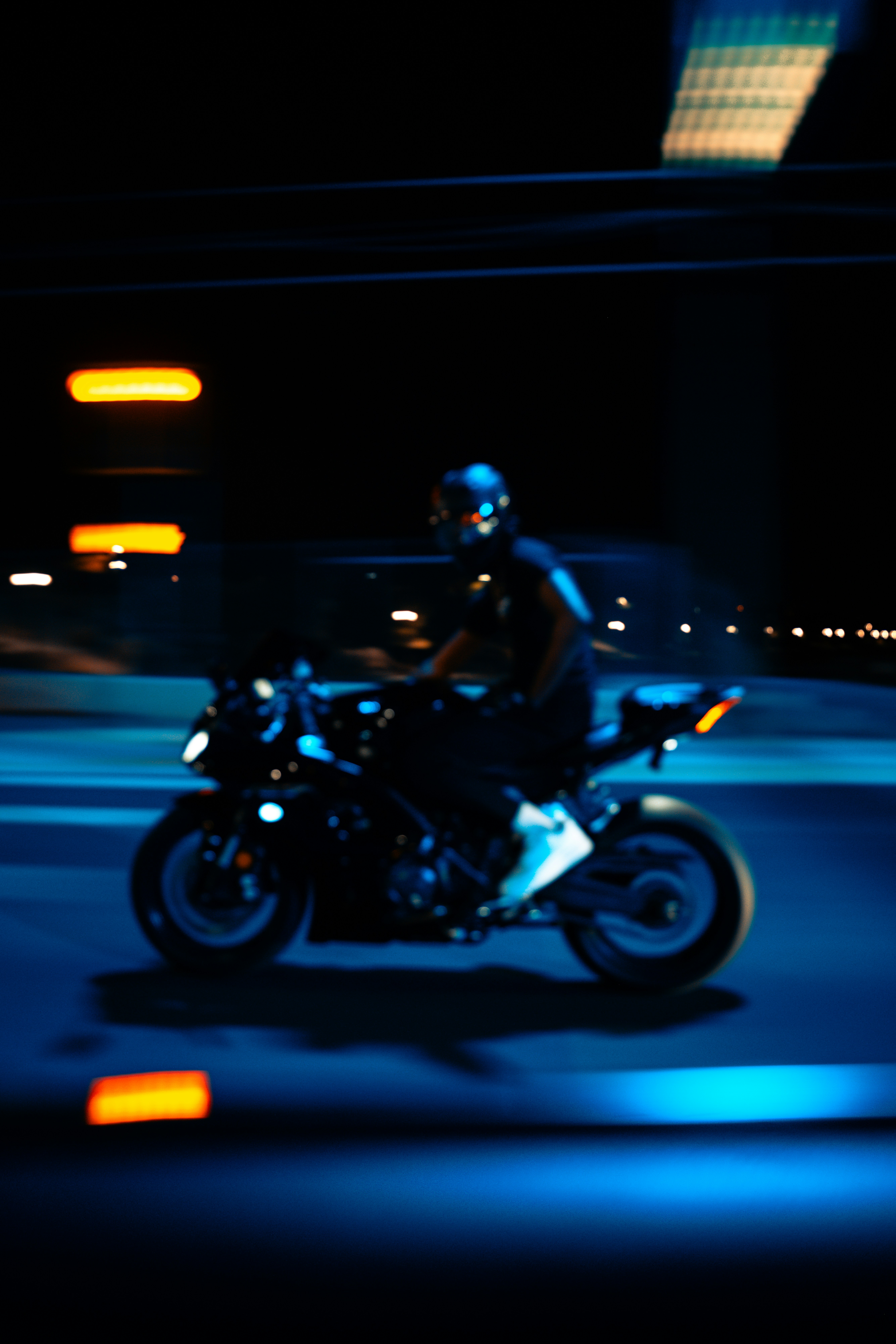 Neon Night Ride: A Blur of Speed Under City Lights