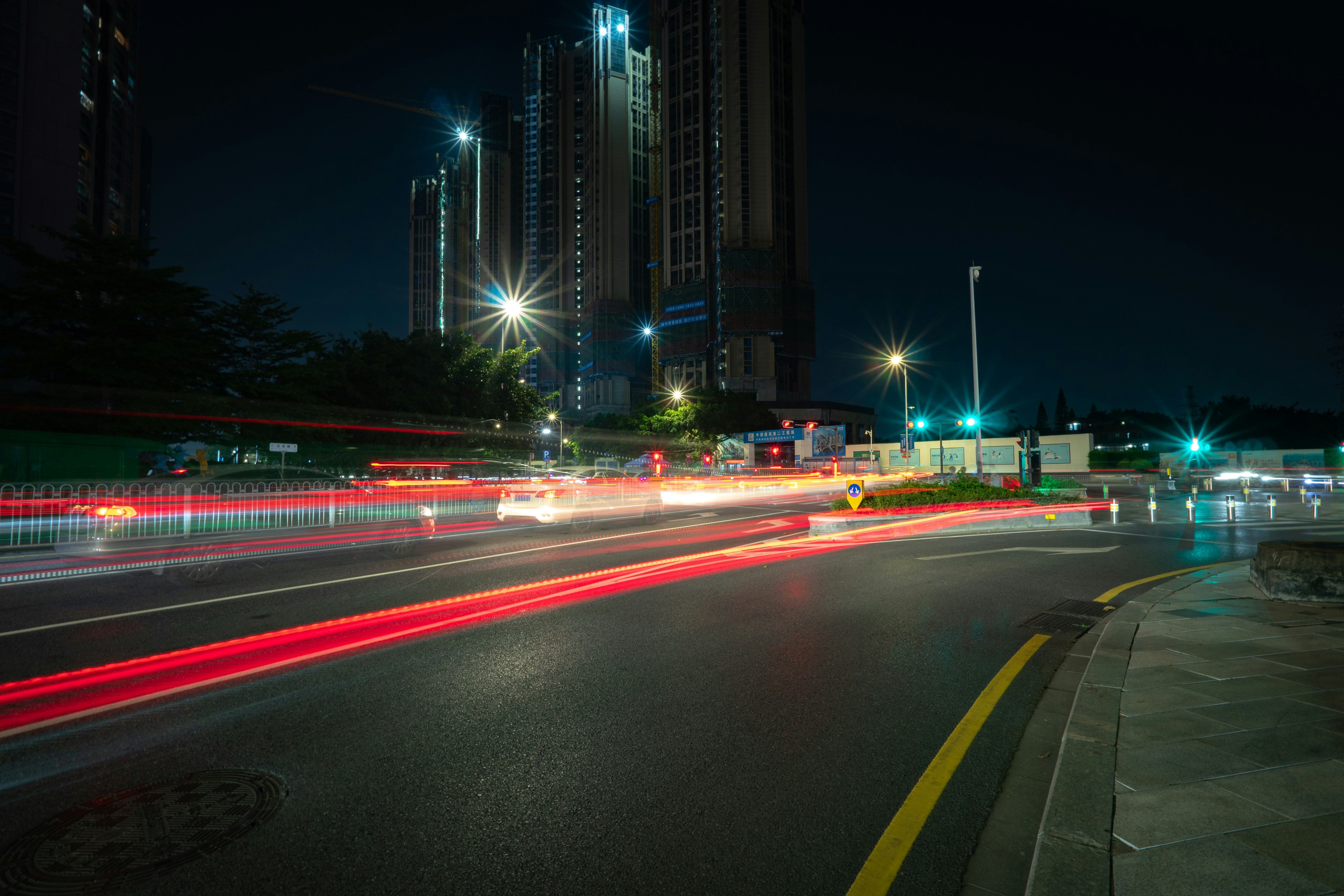 A night time picture of a city street photo – Free Shenzhen Image on ...