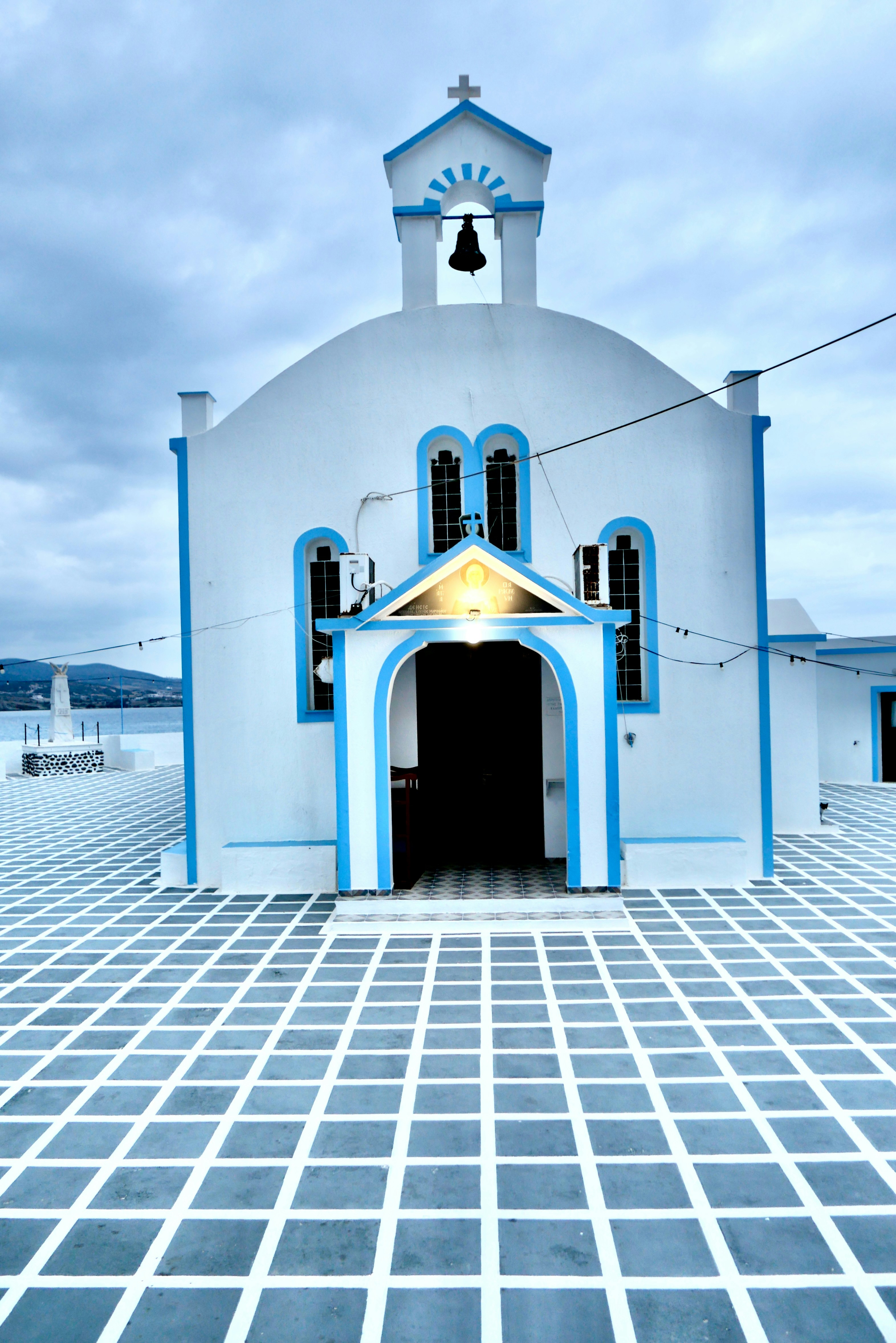 A white and blue church with a bell tower photo – Free City Image on ...