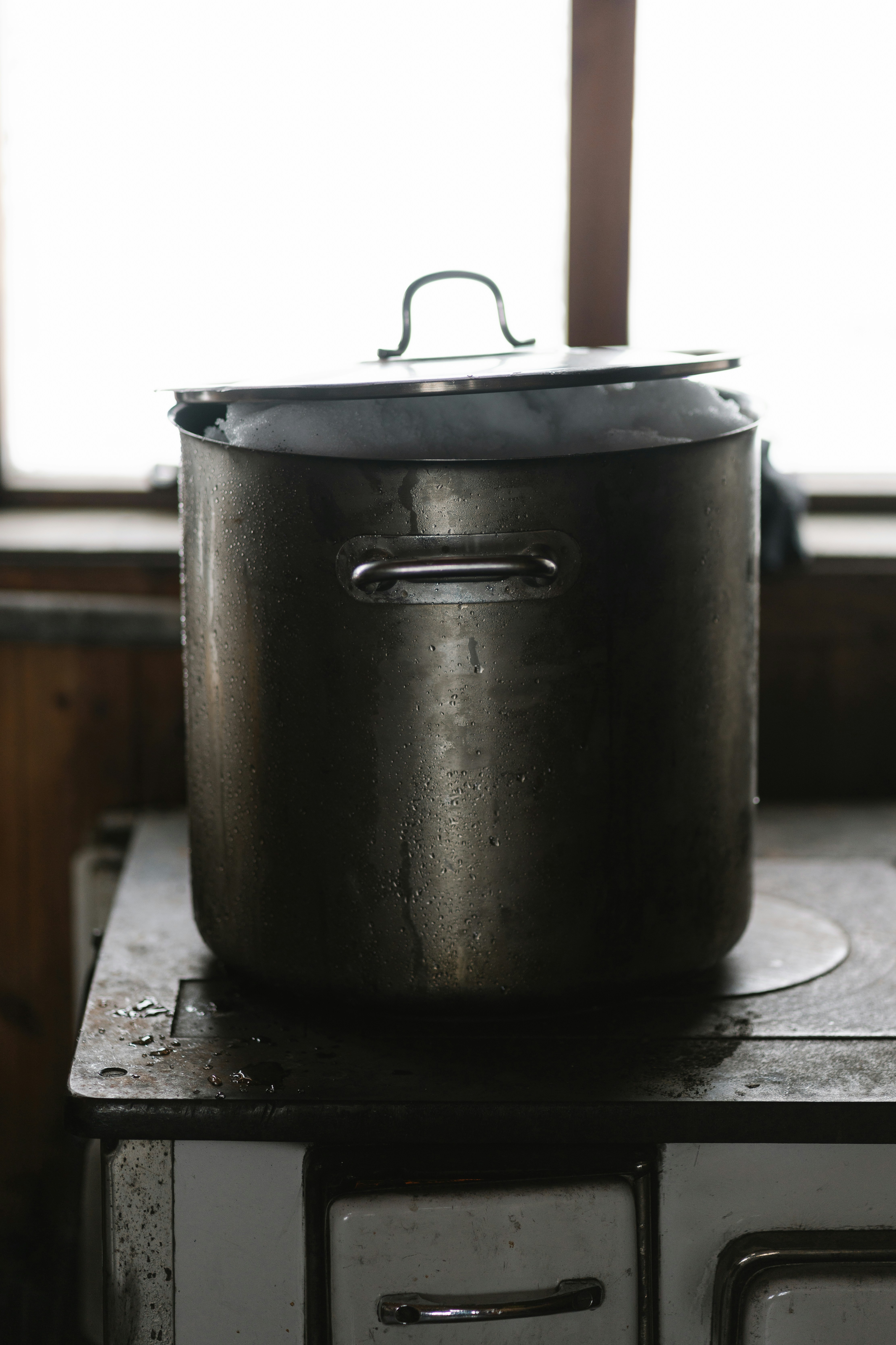 A large pot sitting on top of a stove photo – Free Iceland Image on ...