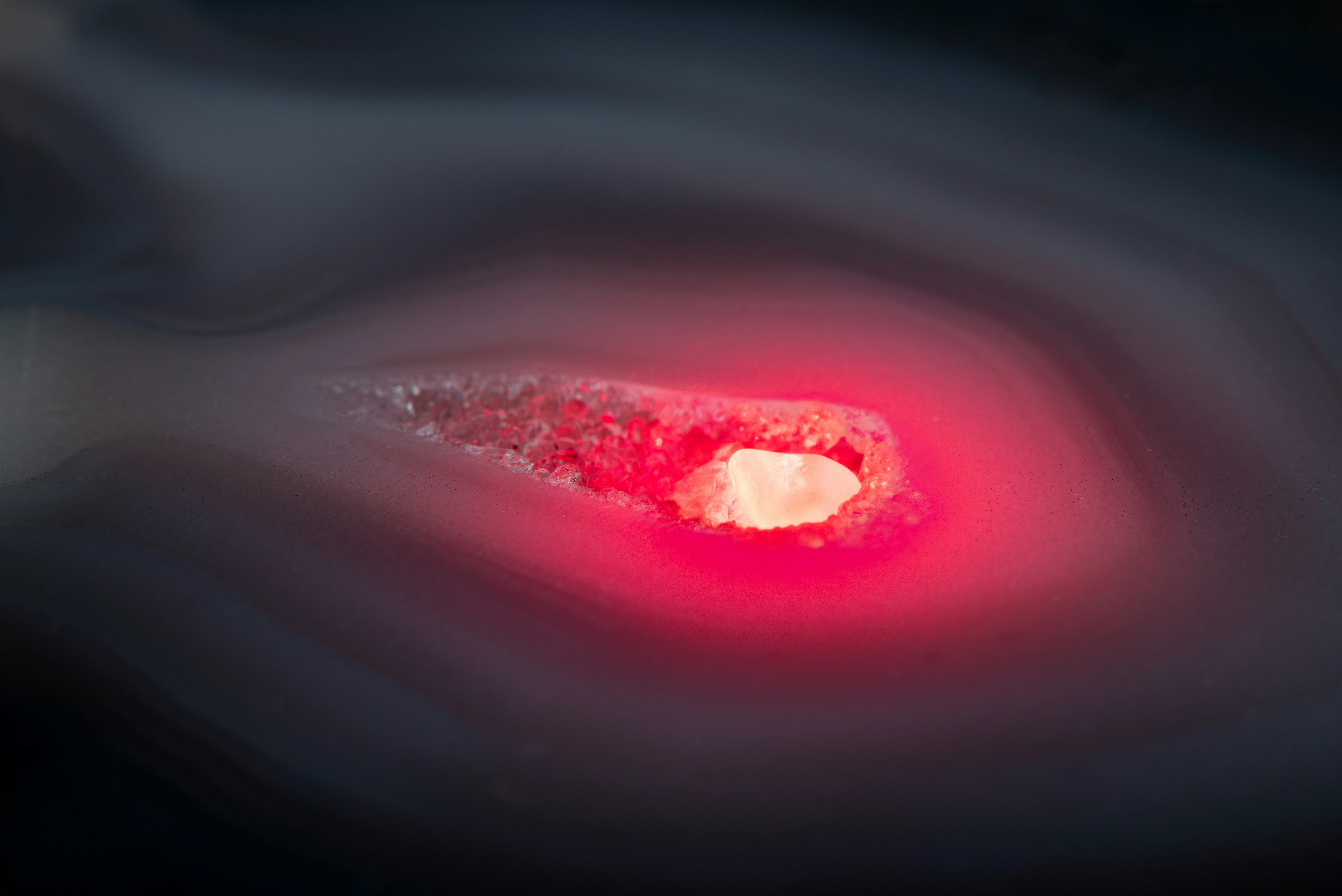 Crimson Halo: A Luminous Core Inside a Velvet Red Ring