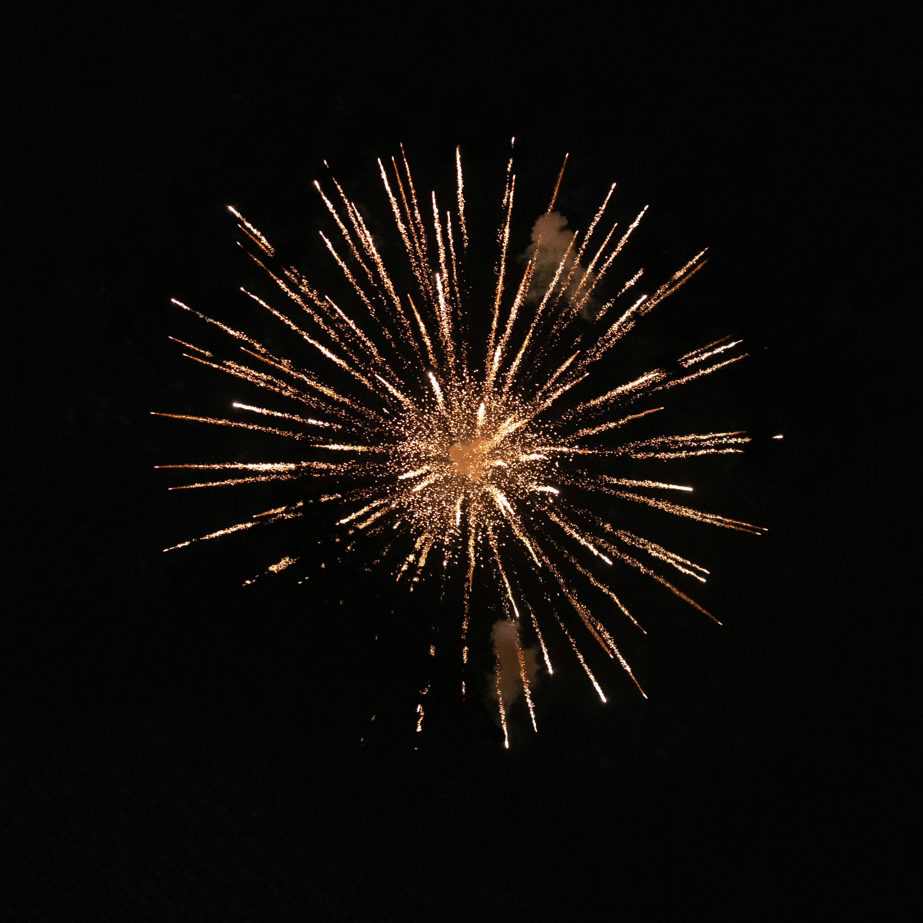 Stellar Burst: Night Sky Explodes with Golden Radiance