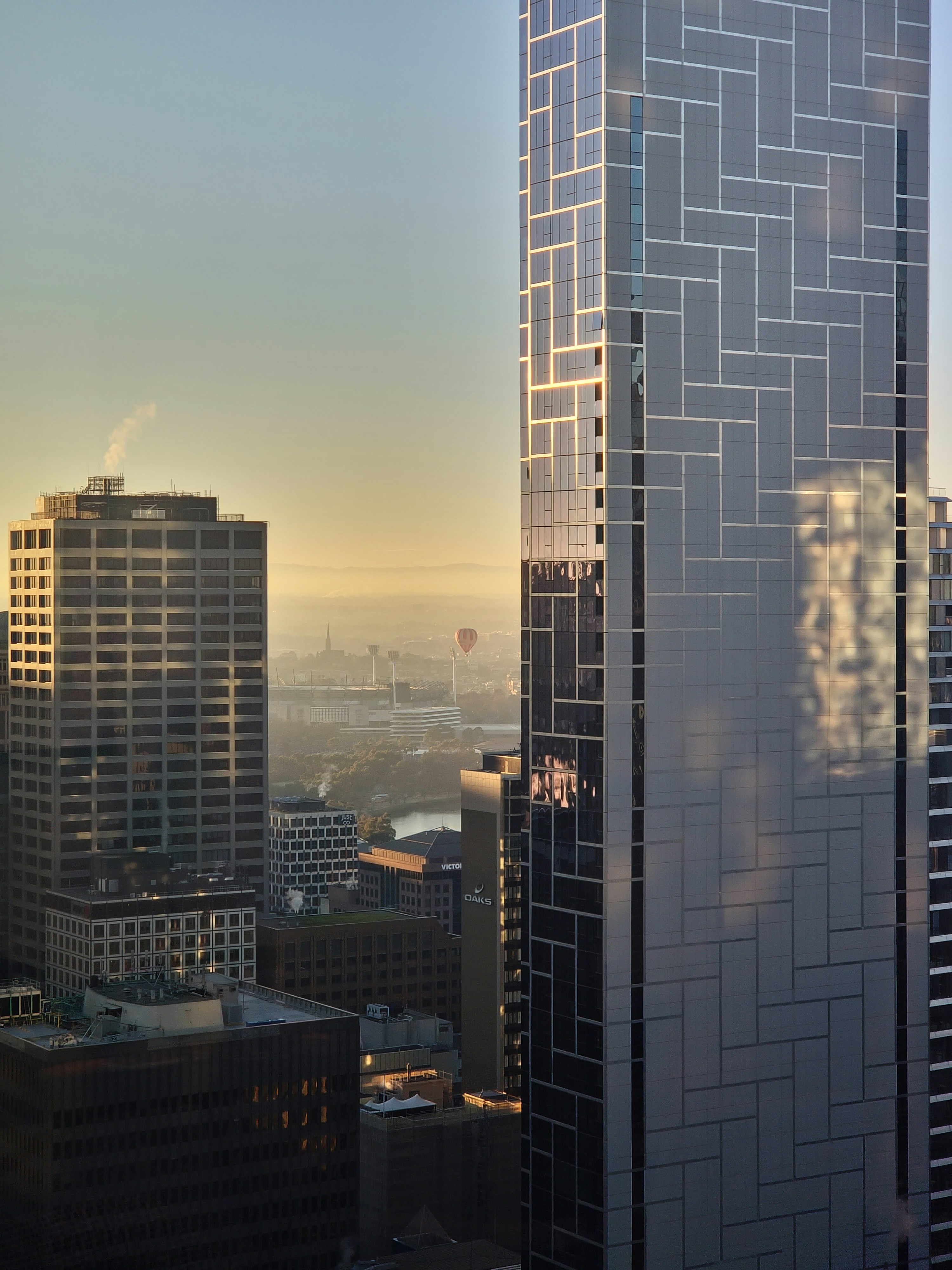 Skyline Serenade: Glass Facades Refracted in Evening Light