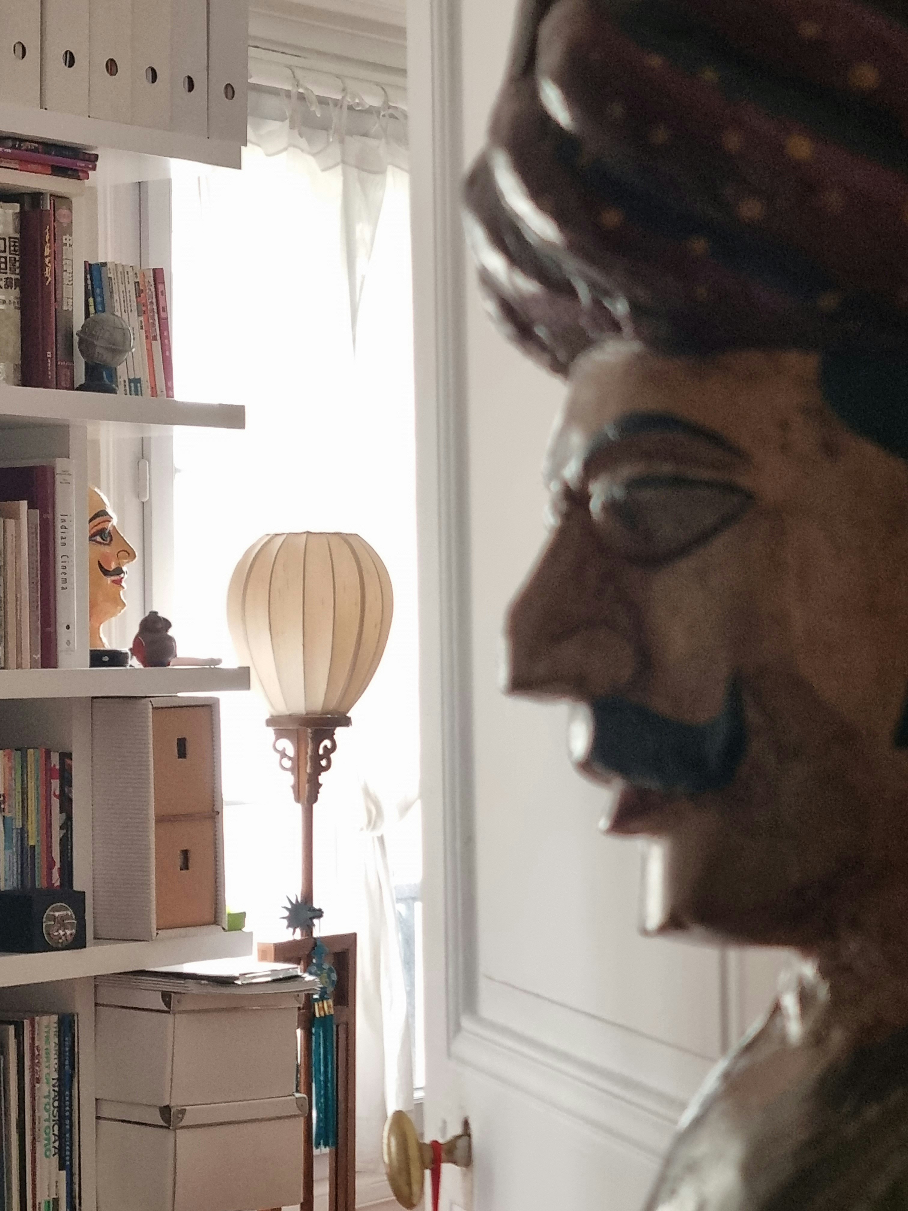 Depth in Light: A Lamp-lit Corner Framed by a Foreground Mask