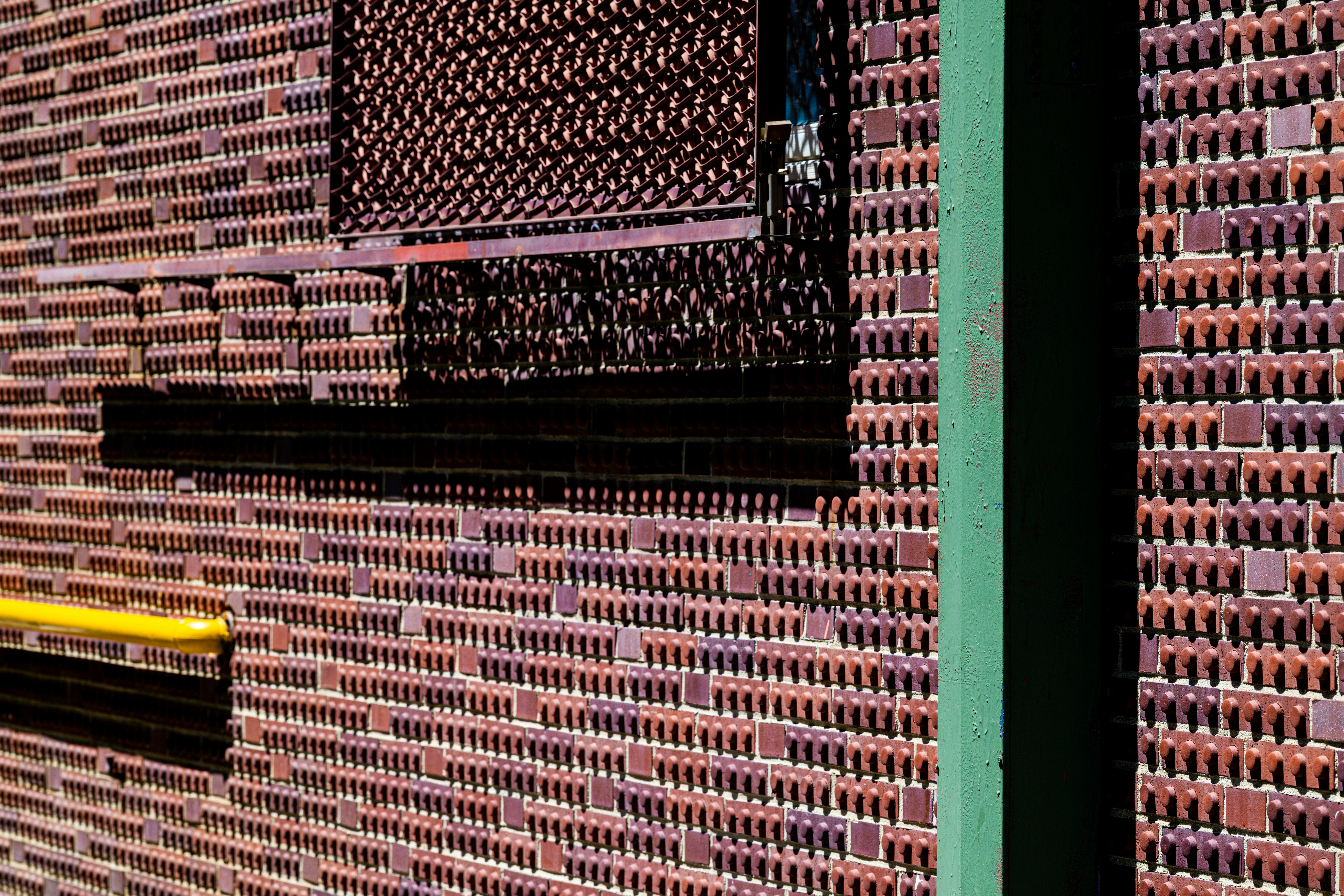 Brick Wall Projections: A Minimal Industrial Facade