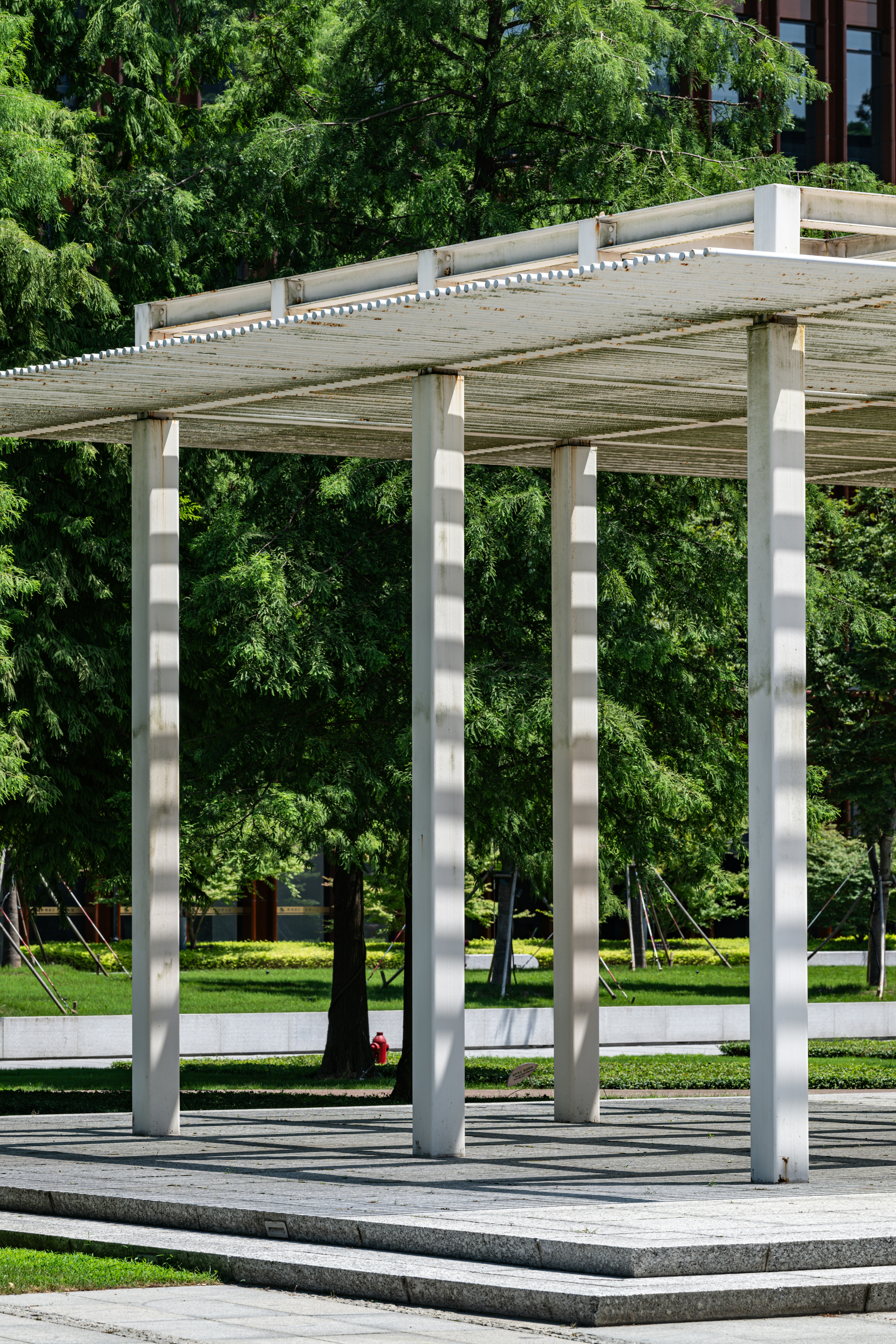 Concrete Pavilion on a Sunlit Campus