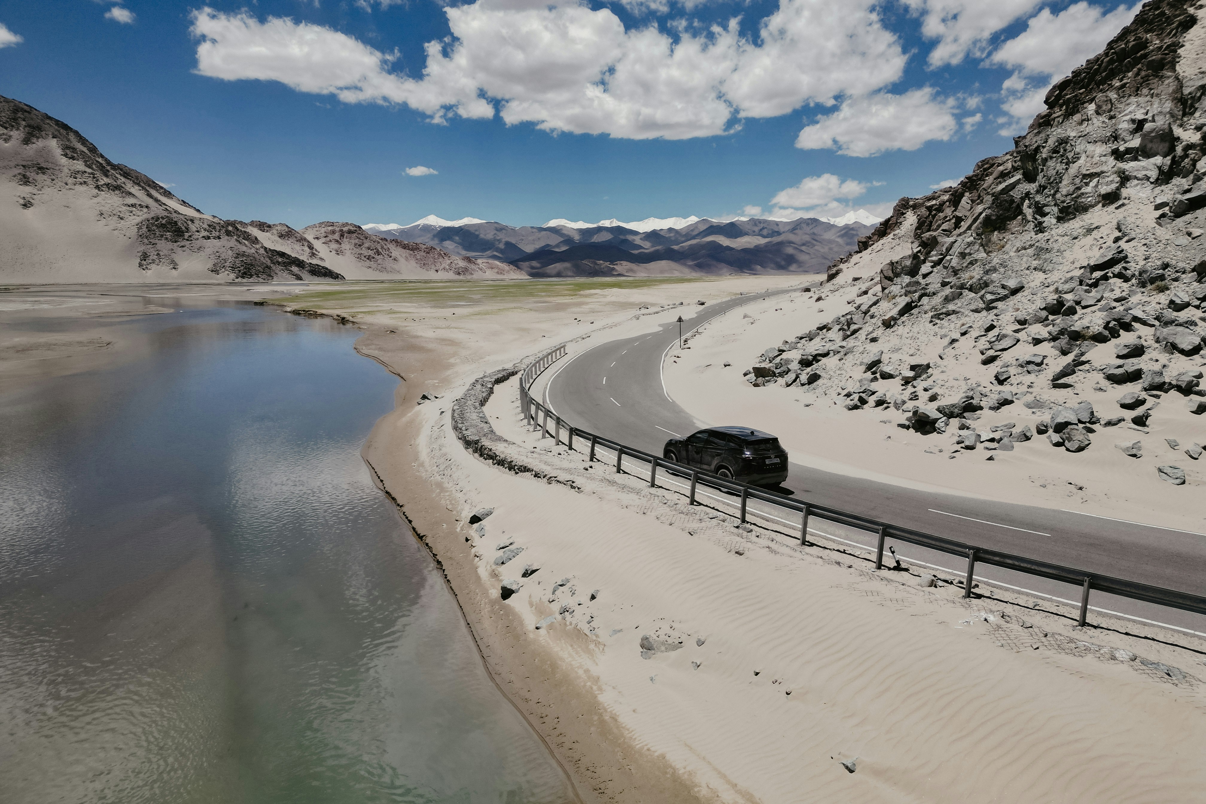 Deserted River Bend Along a Winding Mountain Road