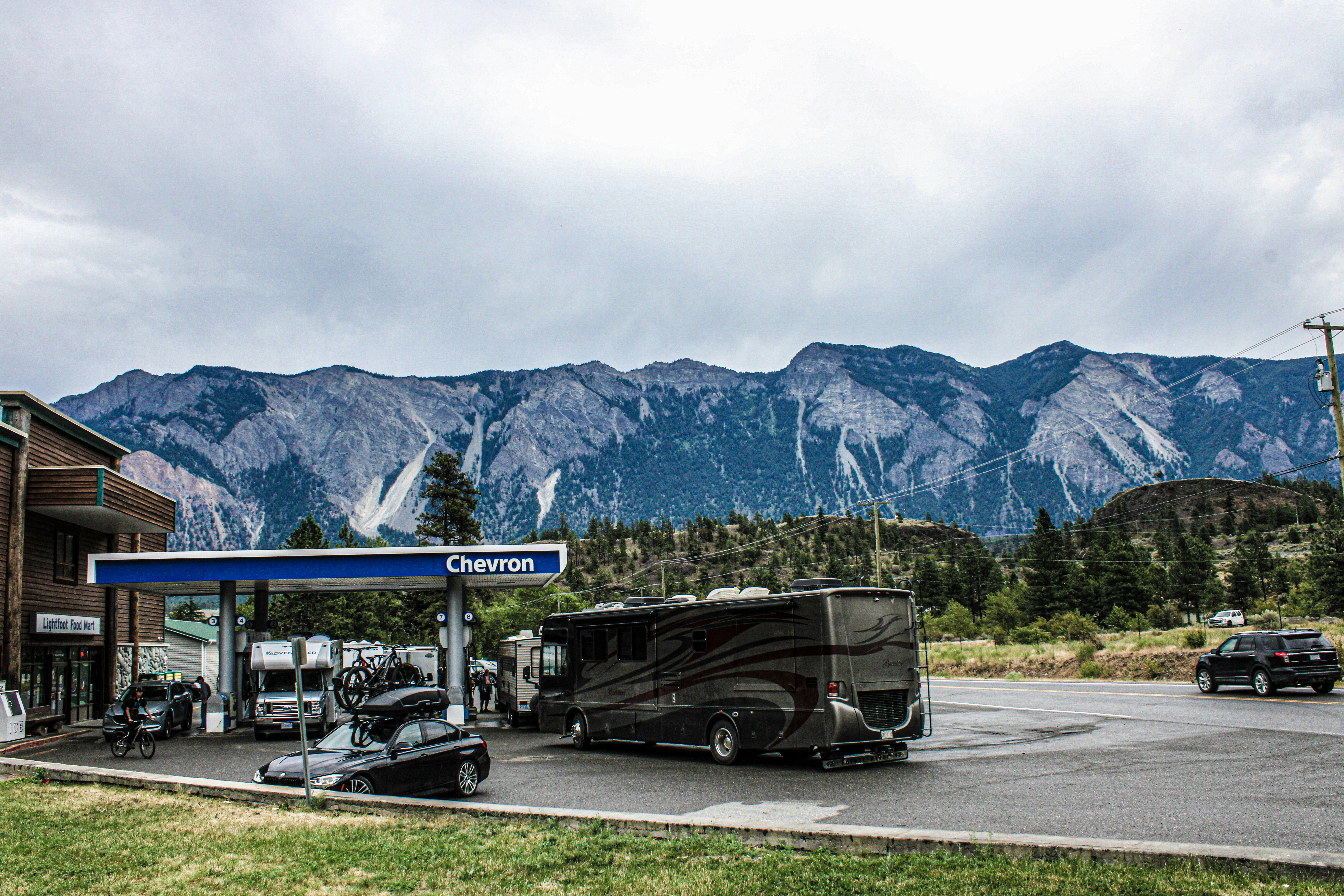 Ridgeview Refuel: RVs at a Chevron Stop Beneath Granite Peaks