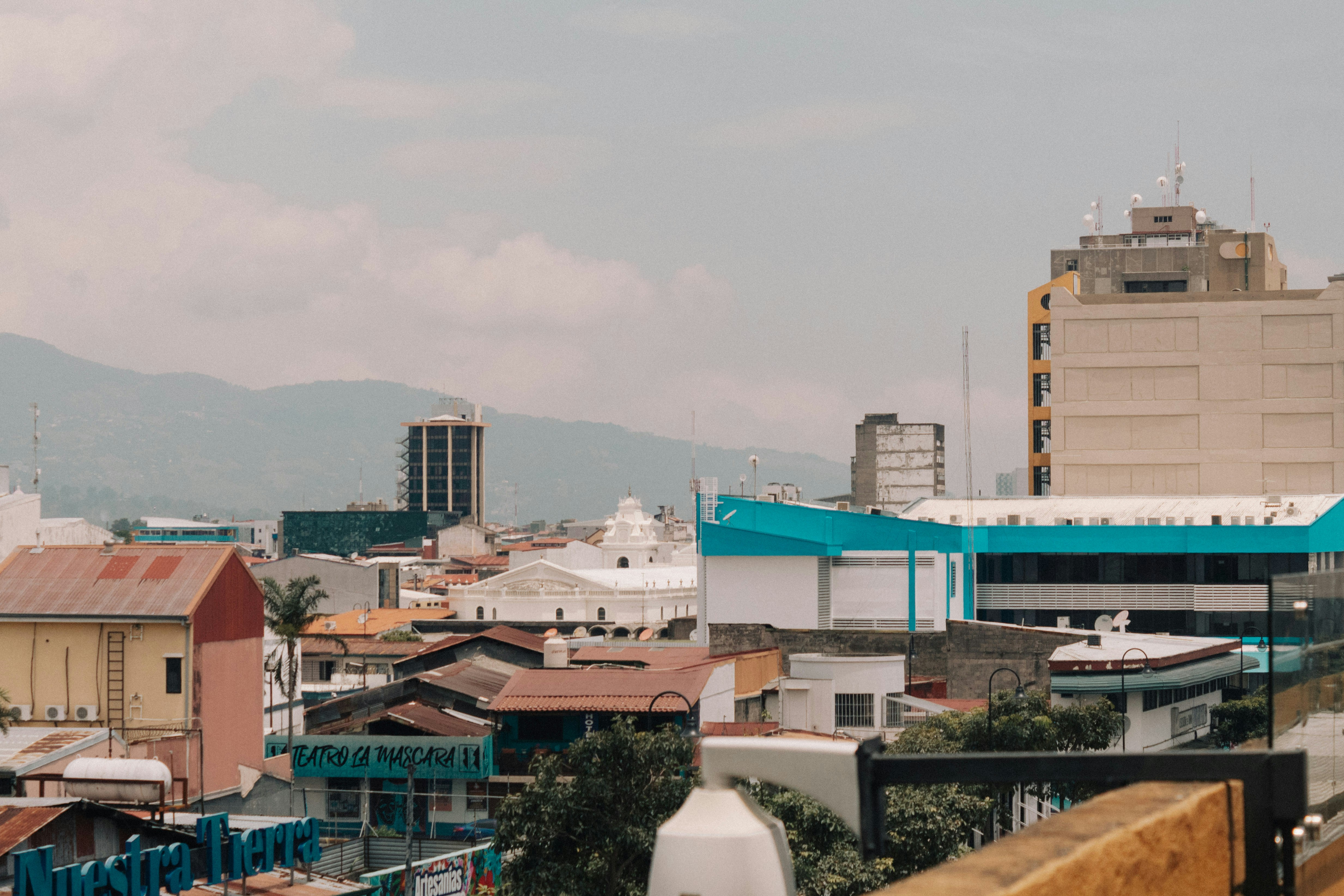 A view of a city from a roof top photo – Free Grey Image on Unsplash