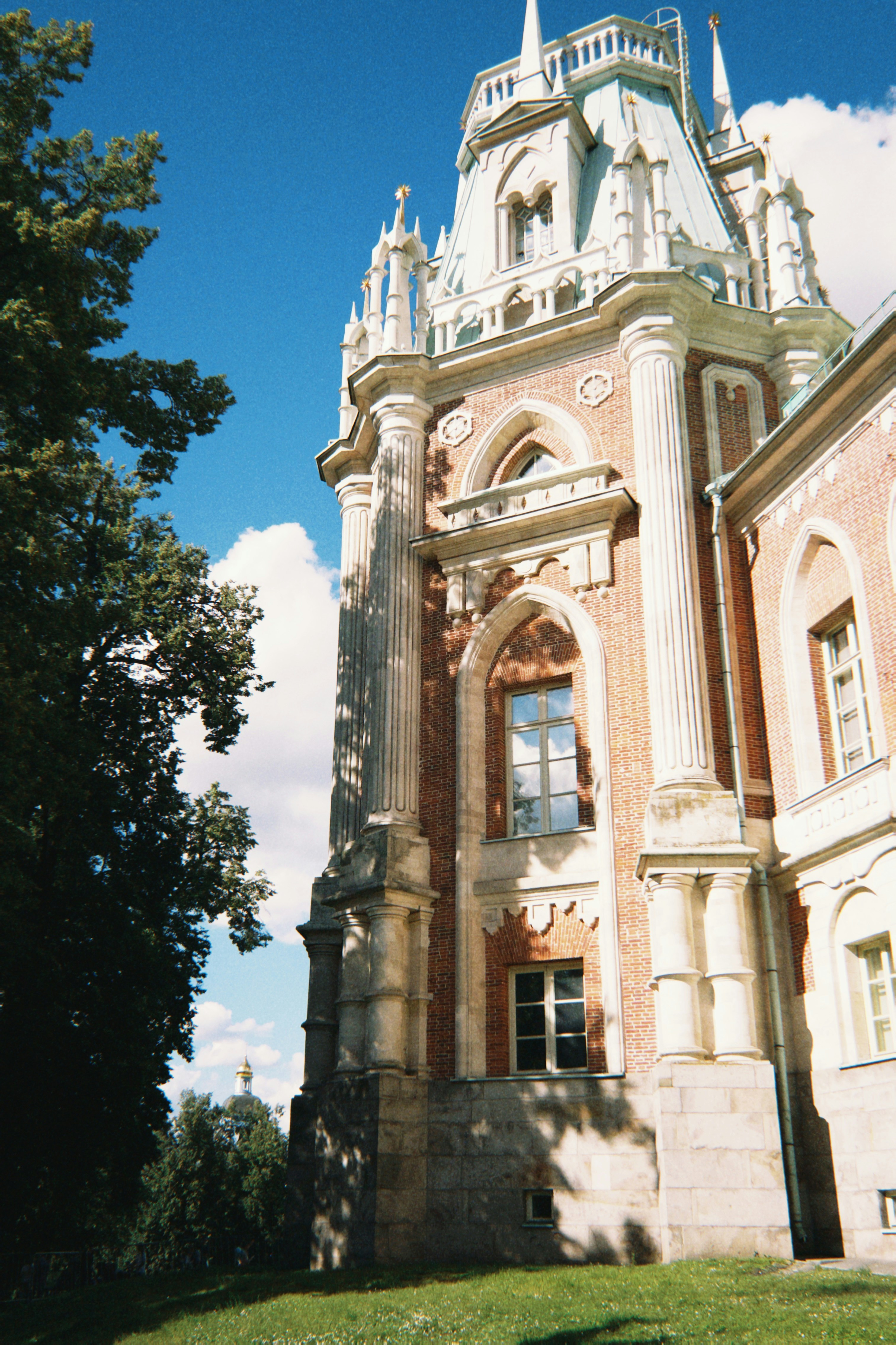 A tall building with a clock on the top of it photo – Free Castle Image ...