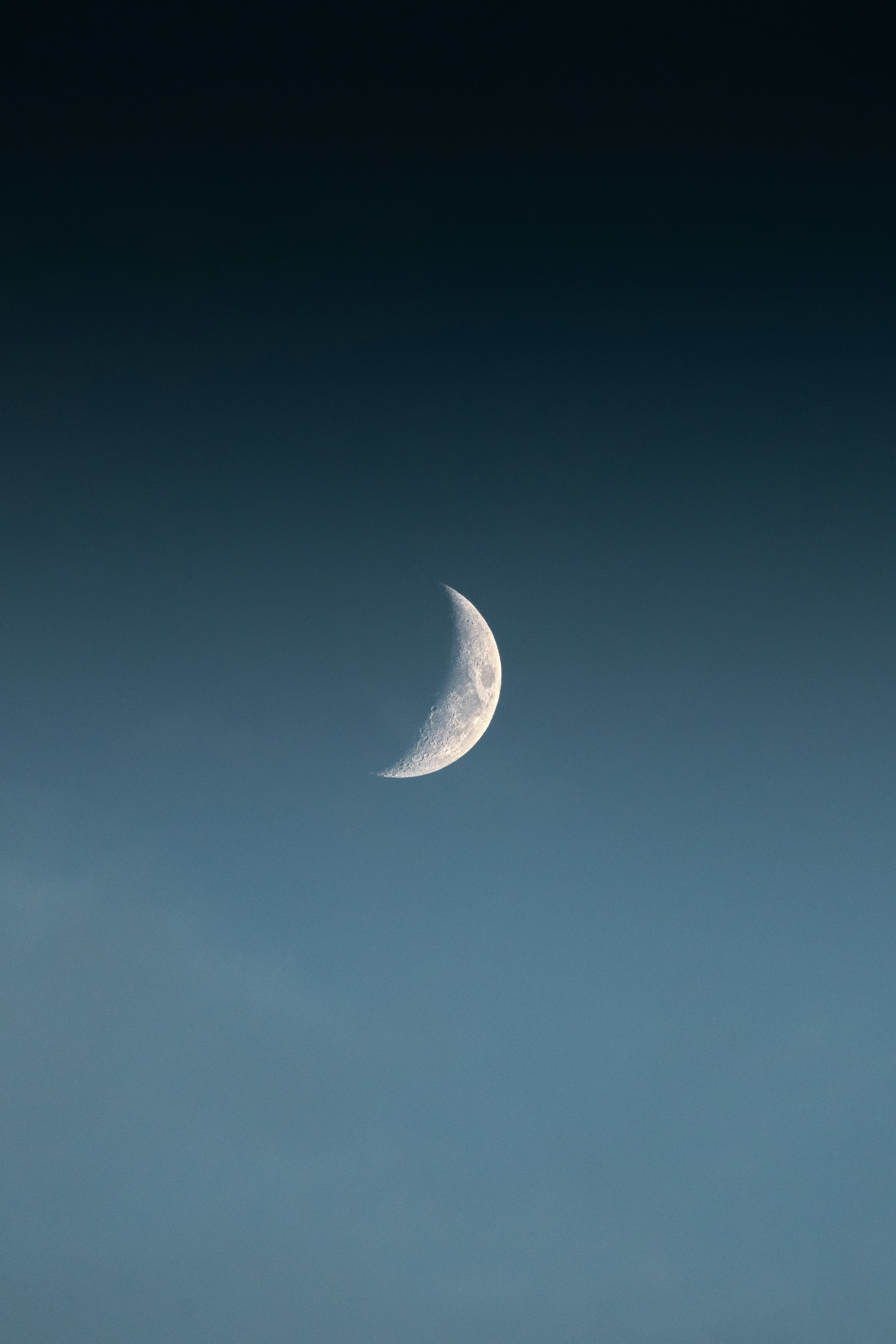 A half moon is seen in the sky photo – Free Moon Image on Unsplash
