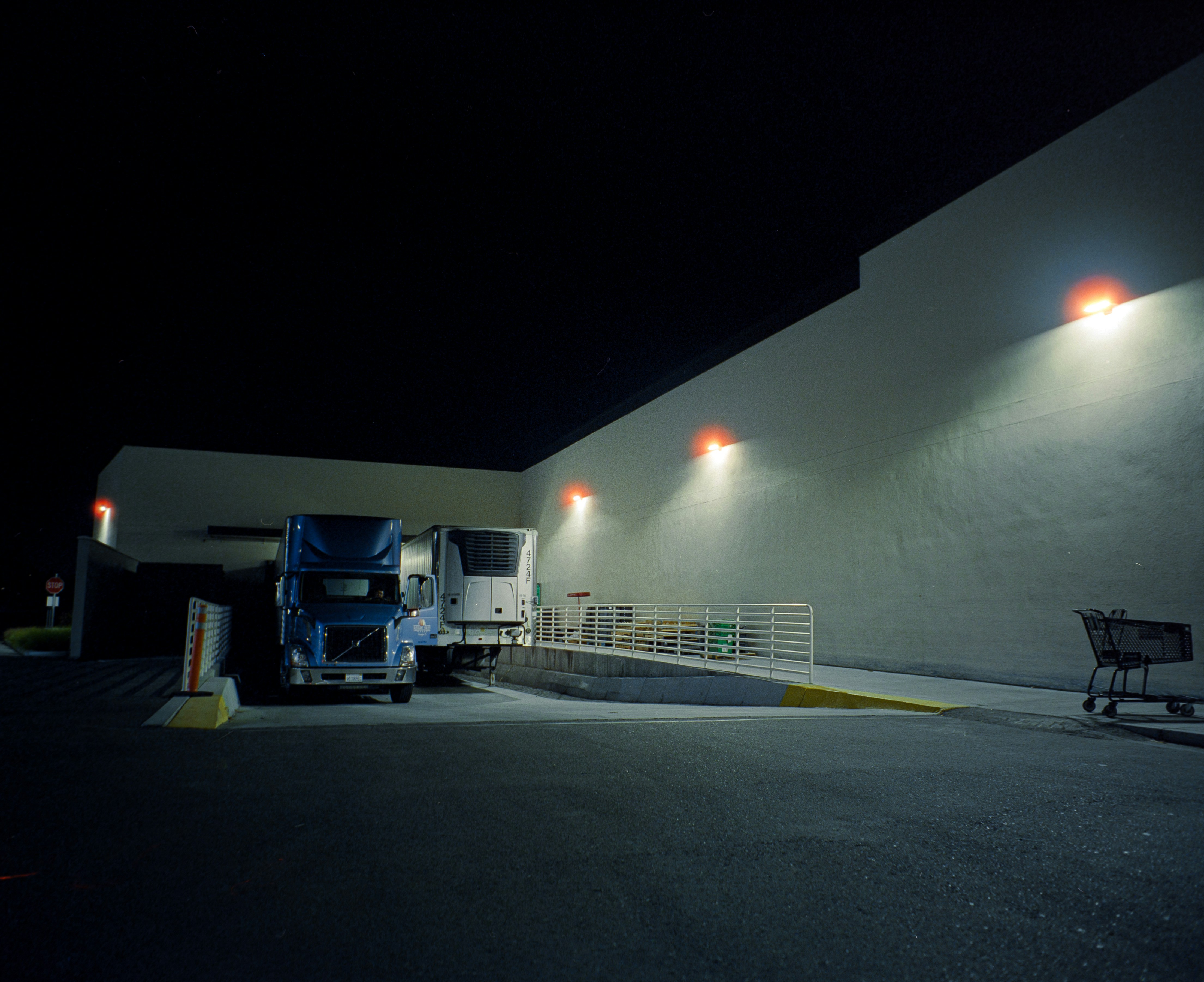 Night Warehouse Loading Zone Under dim amber Lights