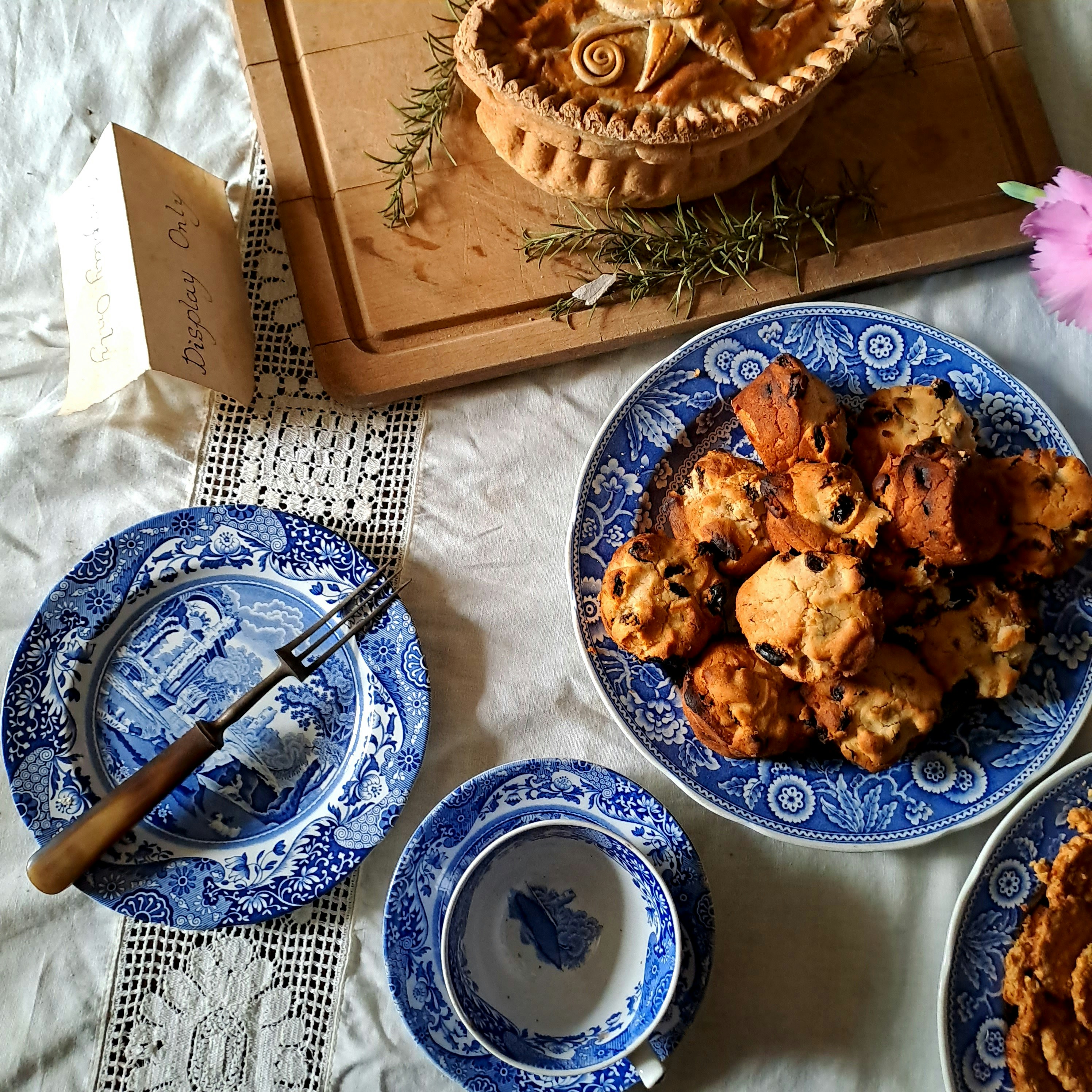 Blue Plates and Golden Muffins: A Cozy Tabletop Still Life