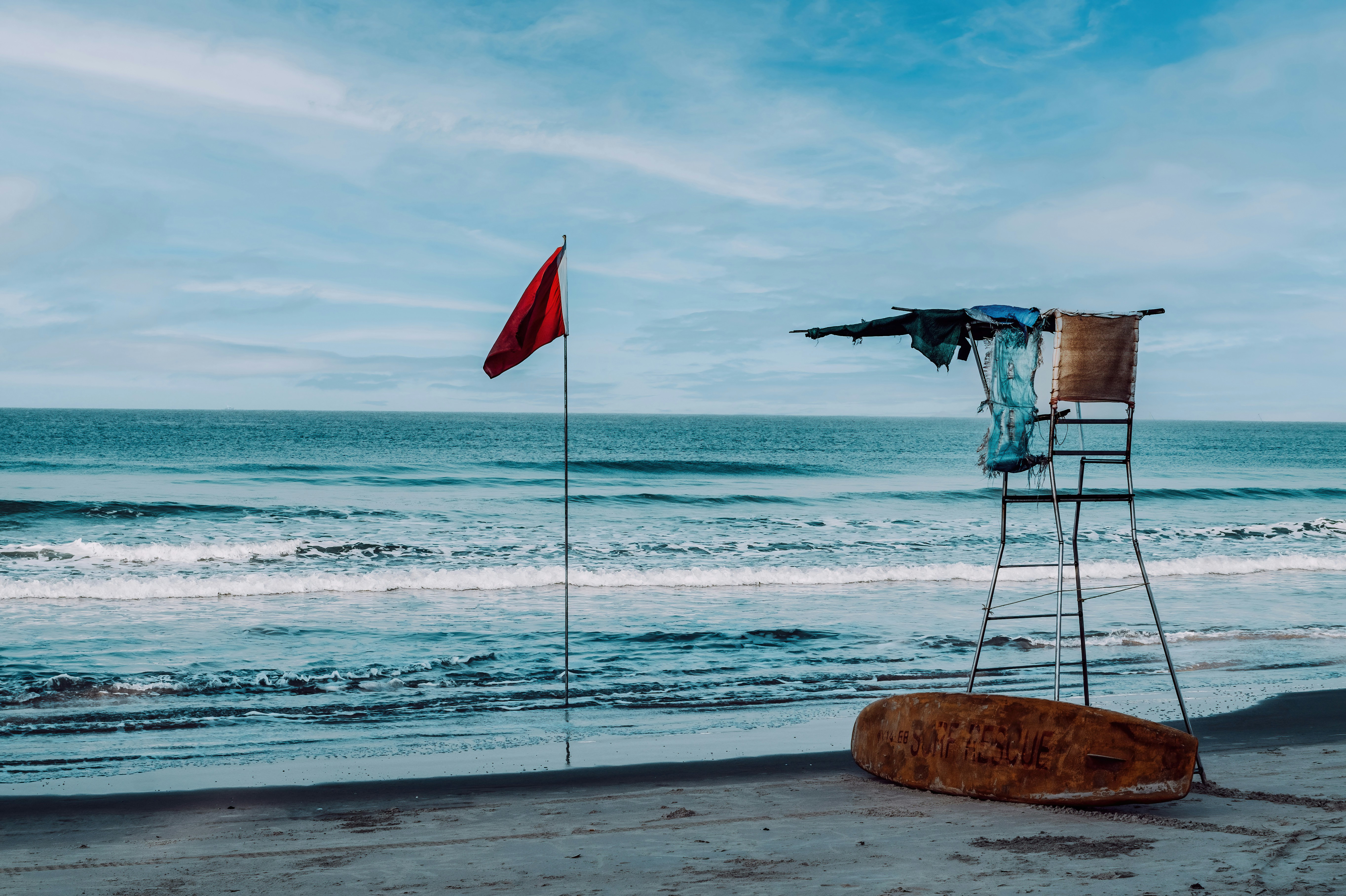 Red Flag on the Distant Shore: A Quiet Lifeguard Post by the Sea