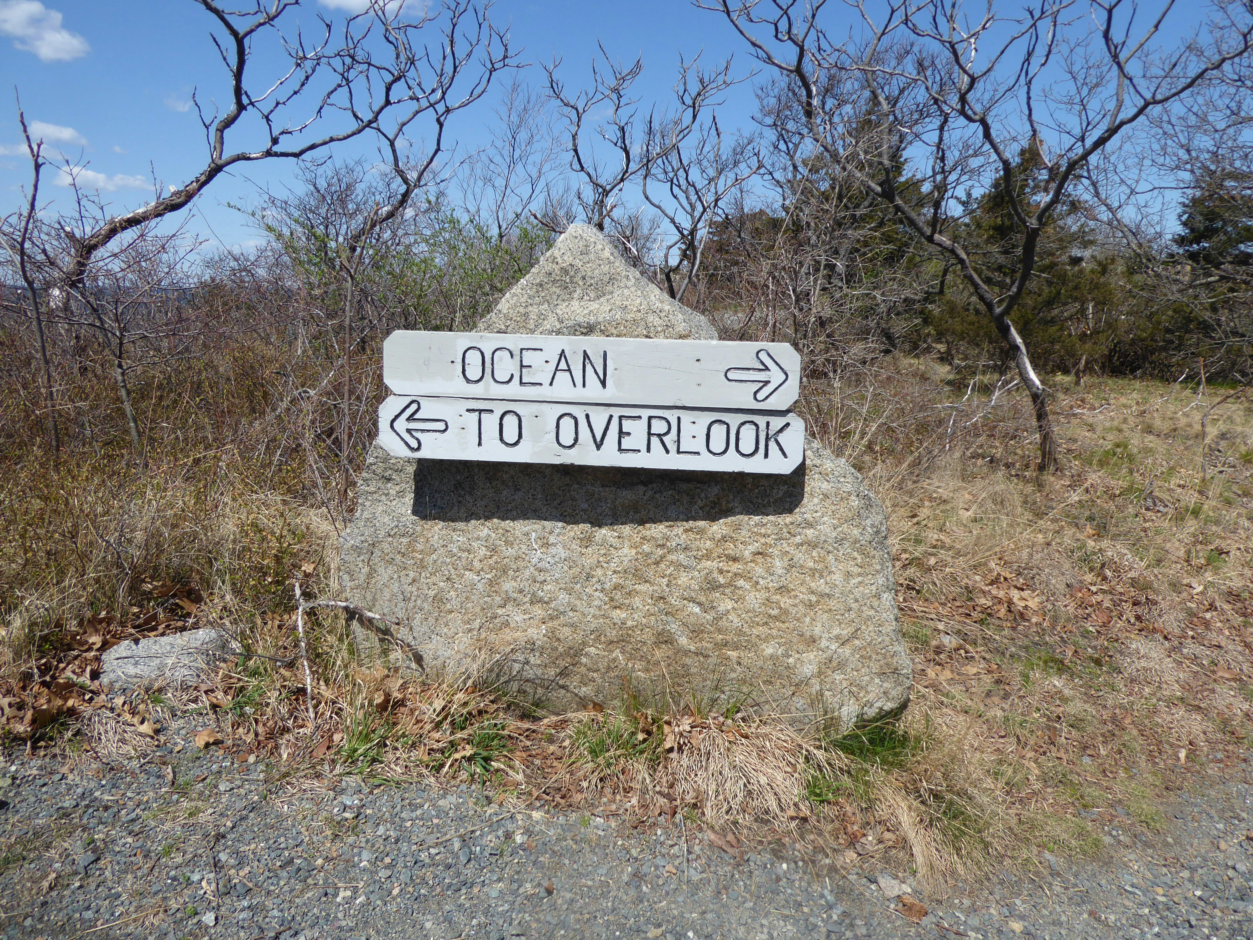 A rock with a sign that says ocean to overlook photo – Free Rock Image ...