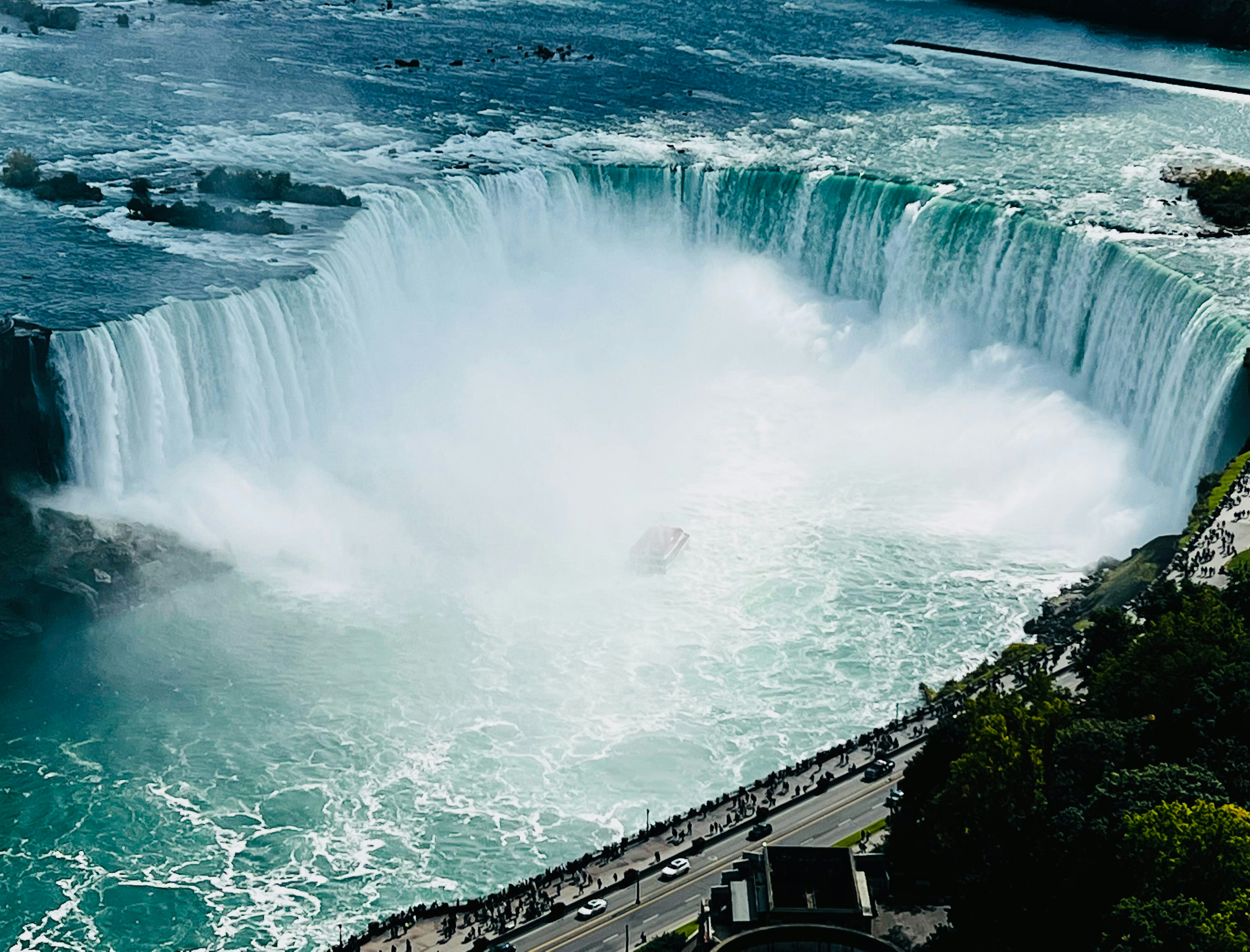 A view of a waterfall from the top of a building photo – Free Outdoors ...