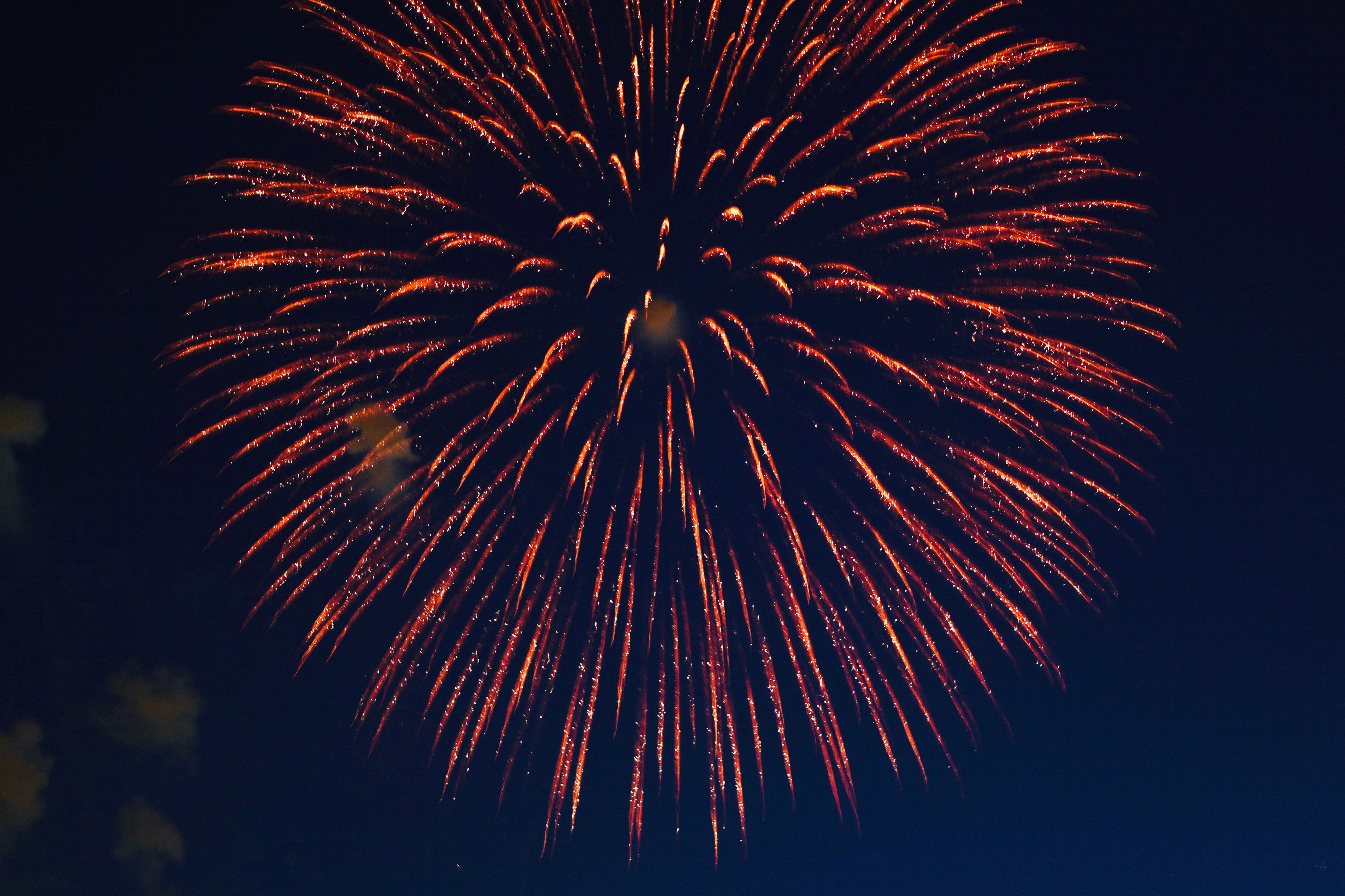 A large fireworks is lit up in the night sky photo – Free Grey Image on ...