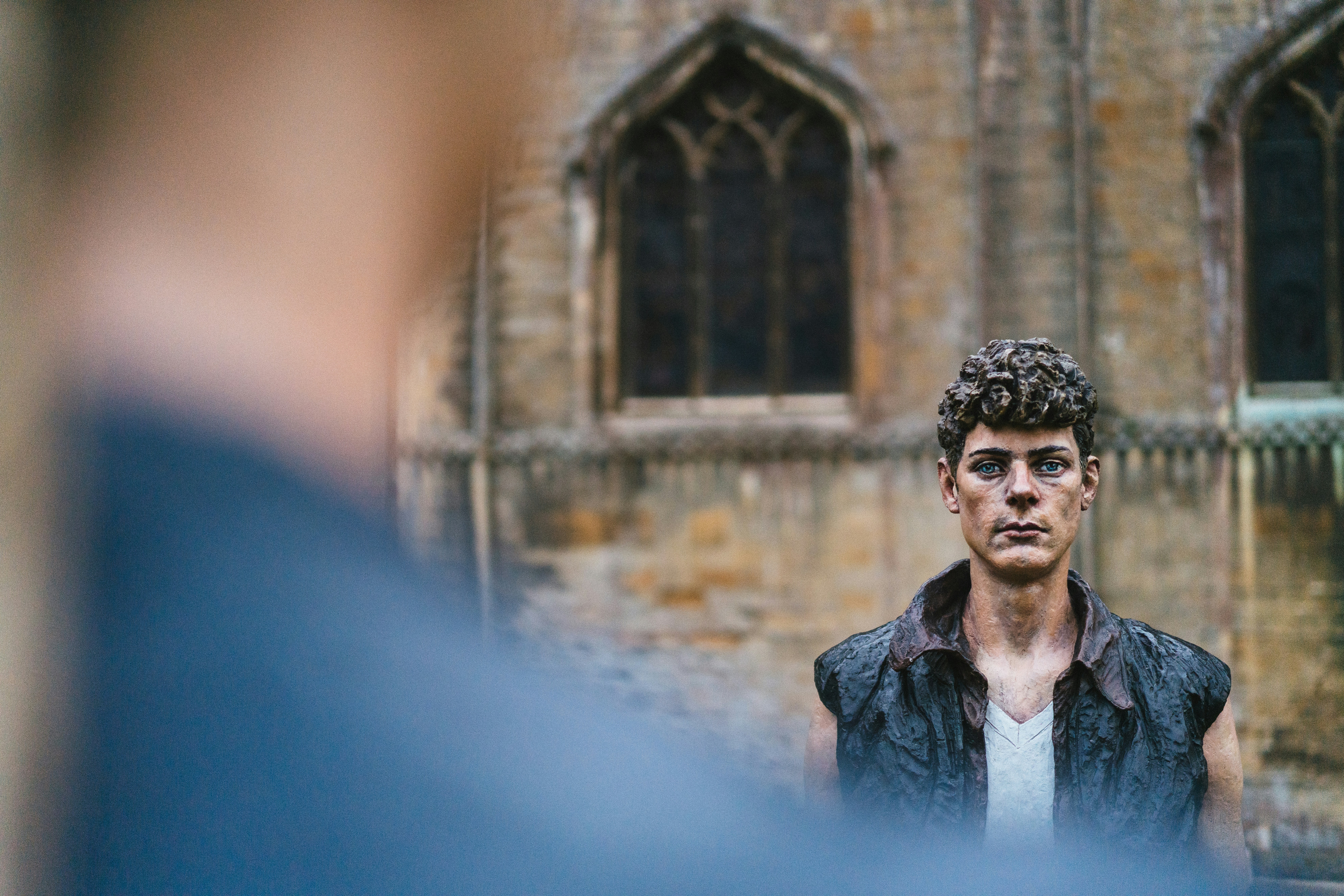 Rain-Kissed Gaze by the Gothic Arches