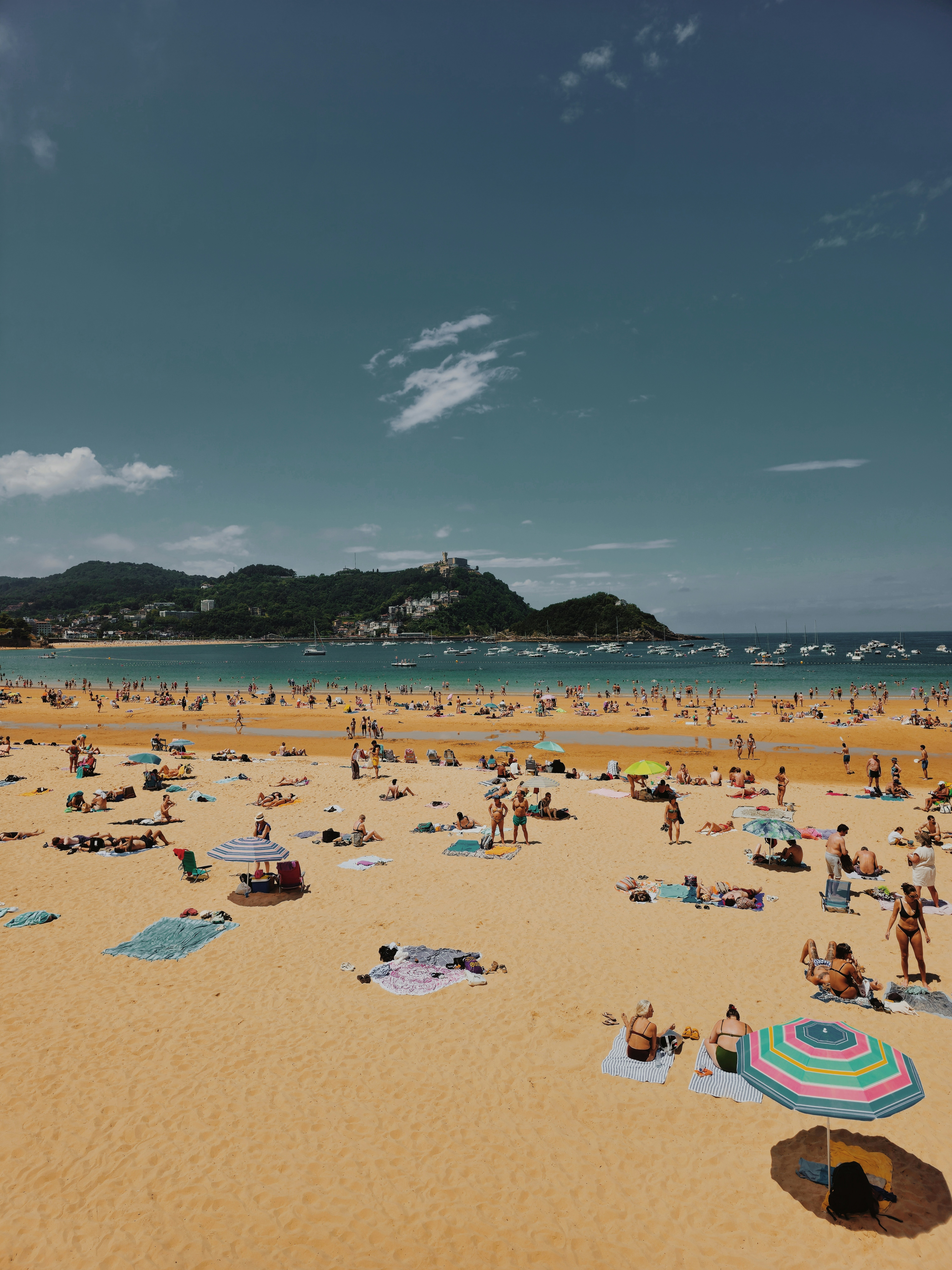 A crowded beach with a lot of people on it photo – Free San sebastián ...