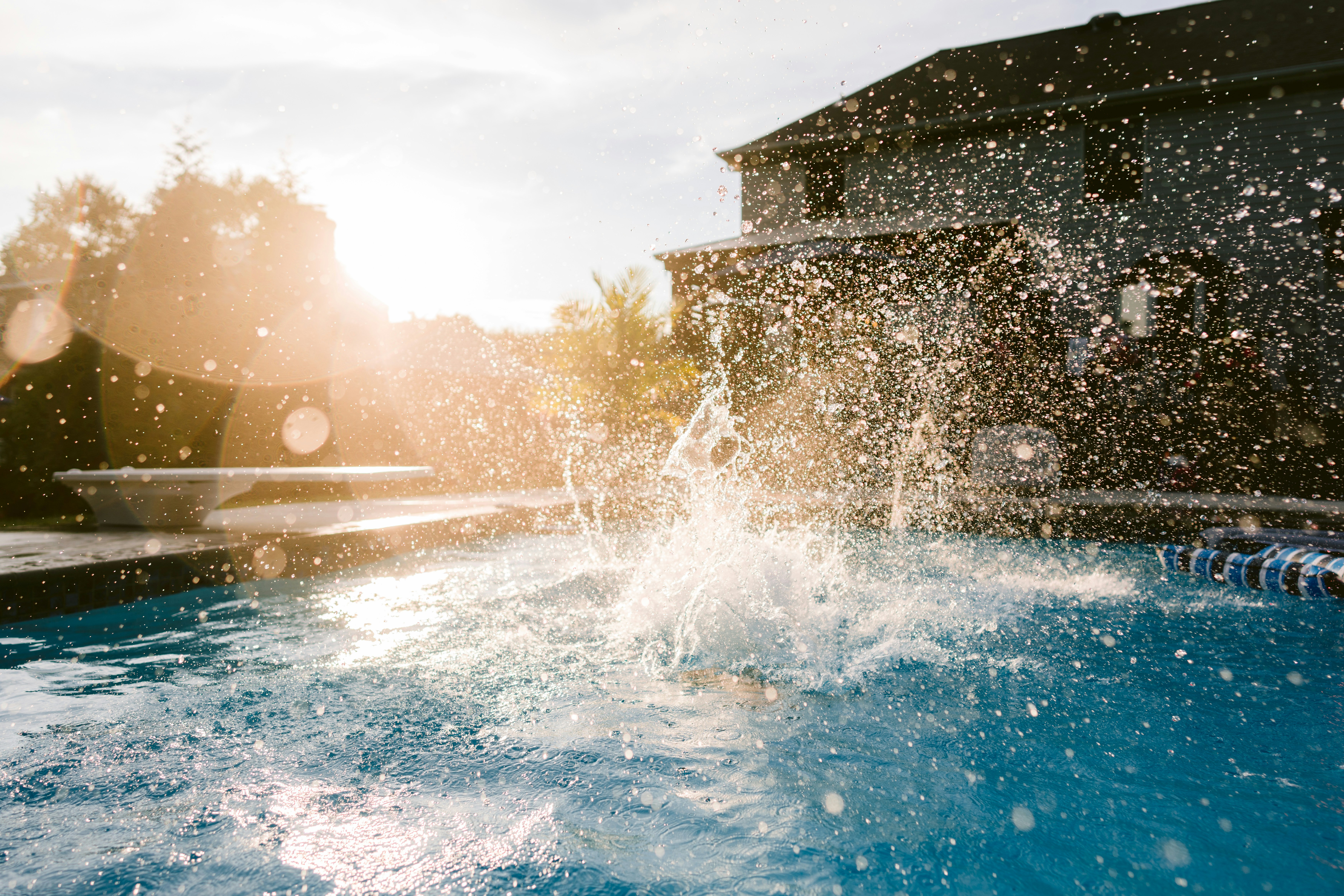 A hot tub with water splashing out of it photo – Free Flipping Image on ...
