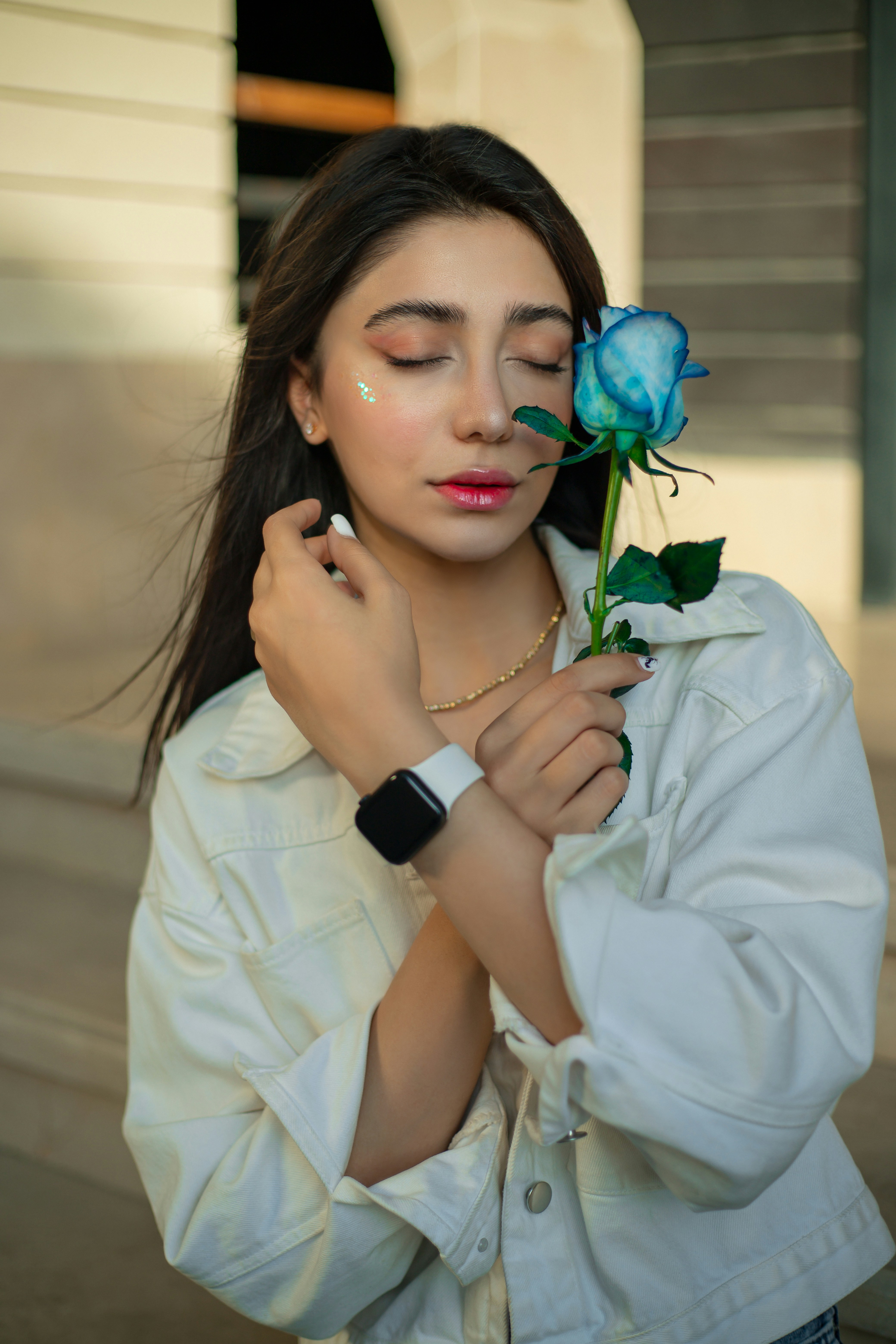 Whispers of Elegance: A Blue Rose Embrace