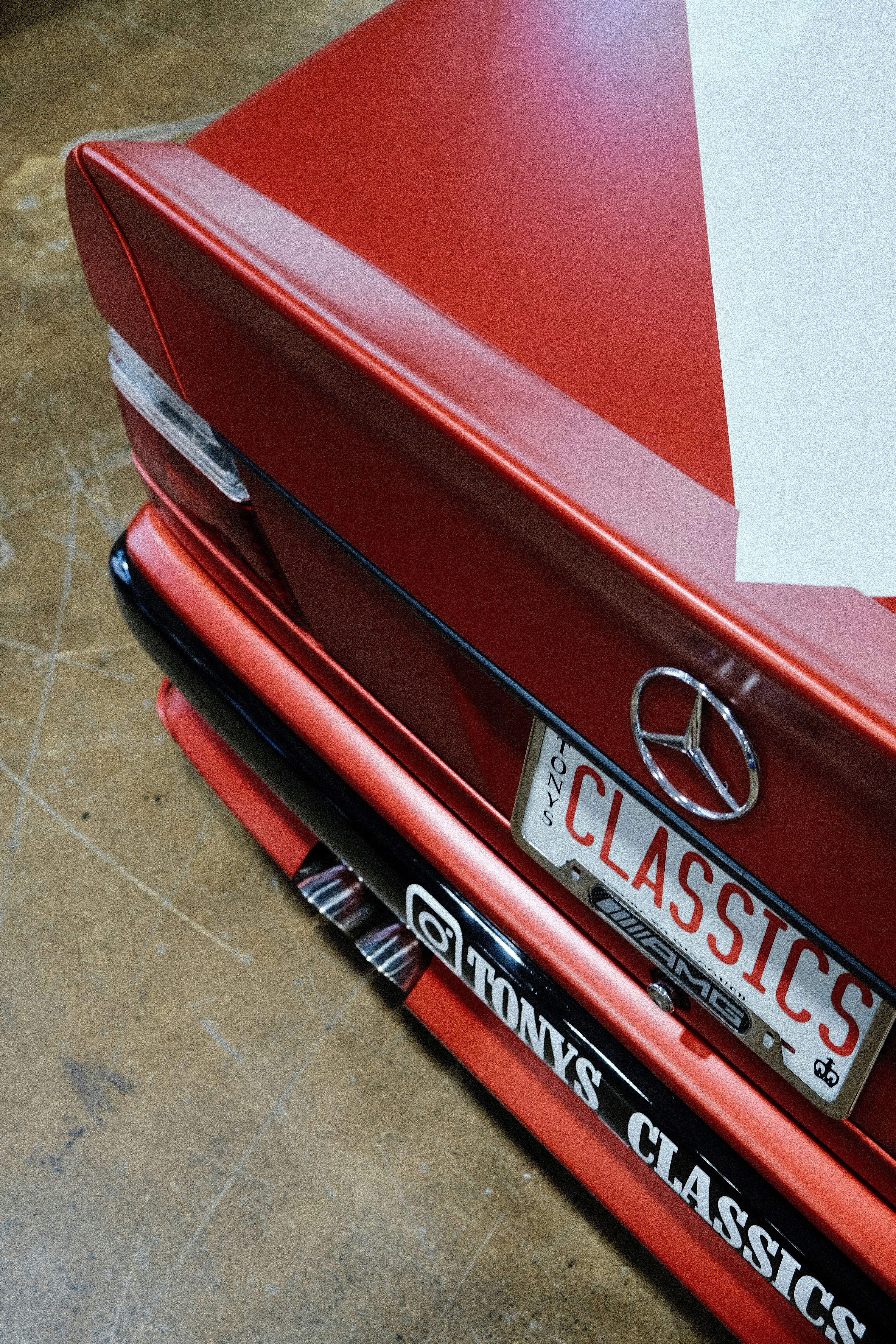A close up of a red car with a mercedes license plate photo – Free Car ...
