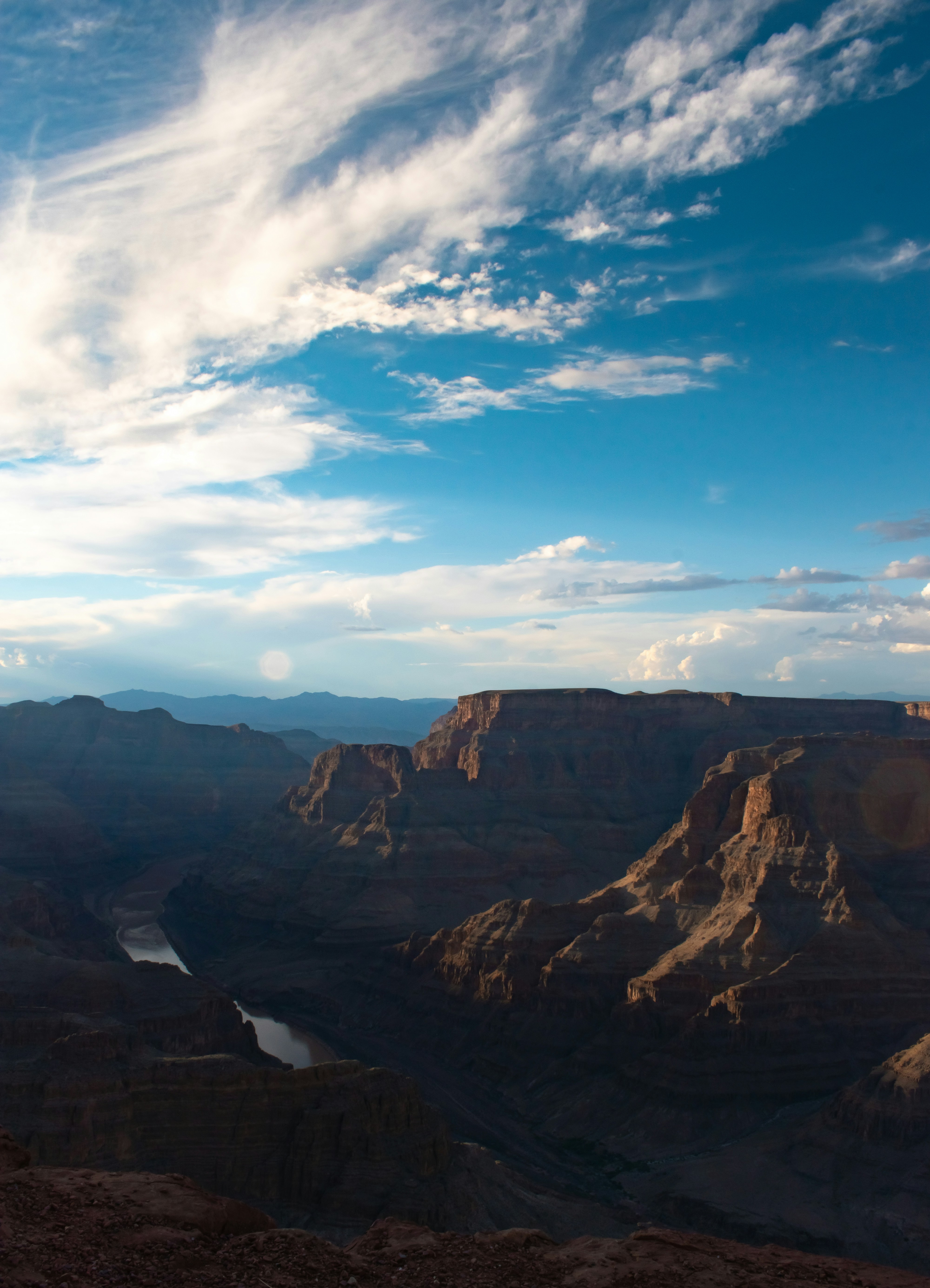 A view of the grand canyon from the rim of a cliff photo – Free Sunset ...