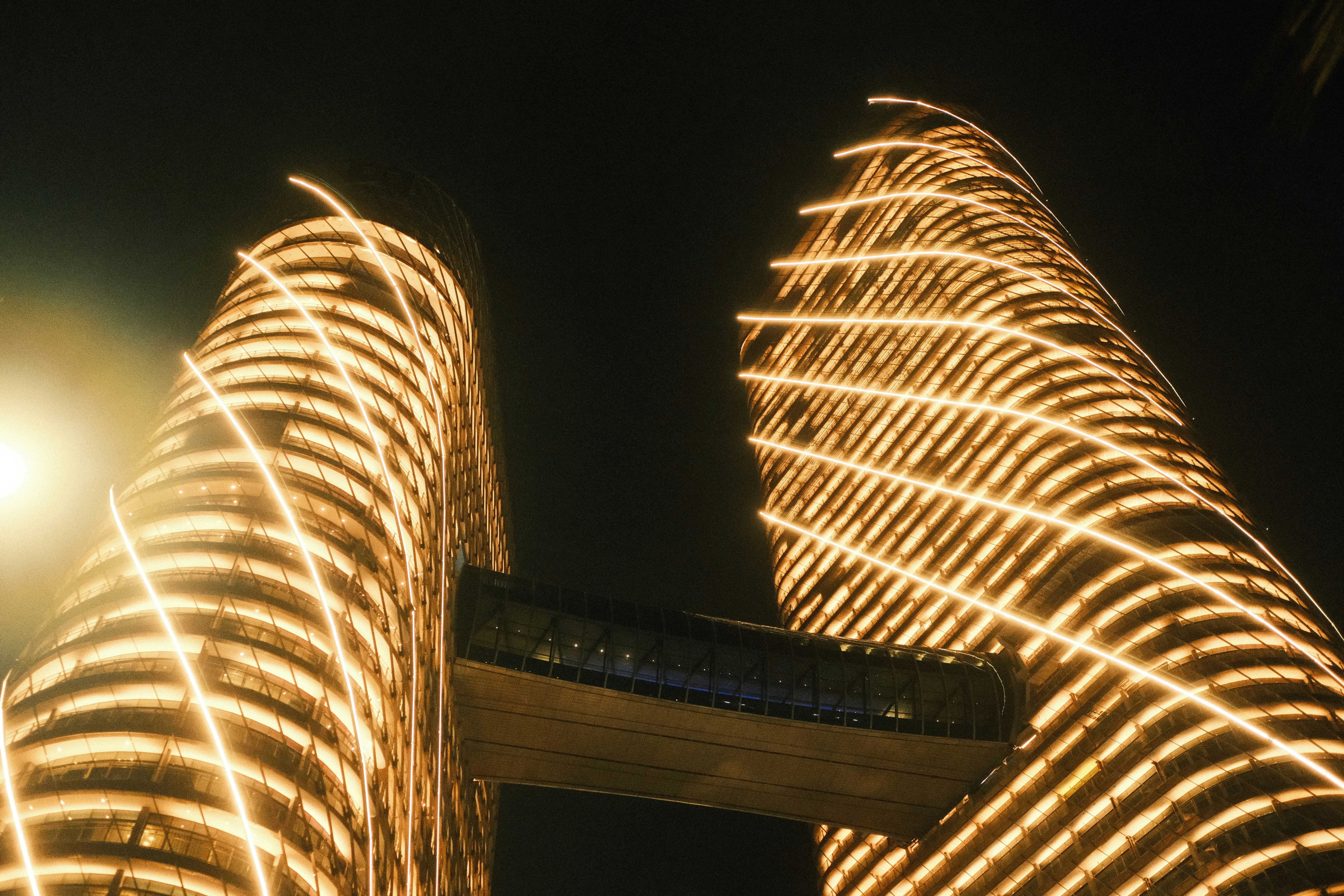 Twin Helical Towers: Night Bridge of Light