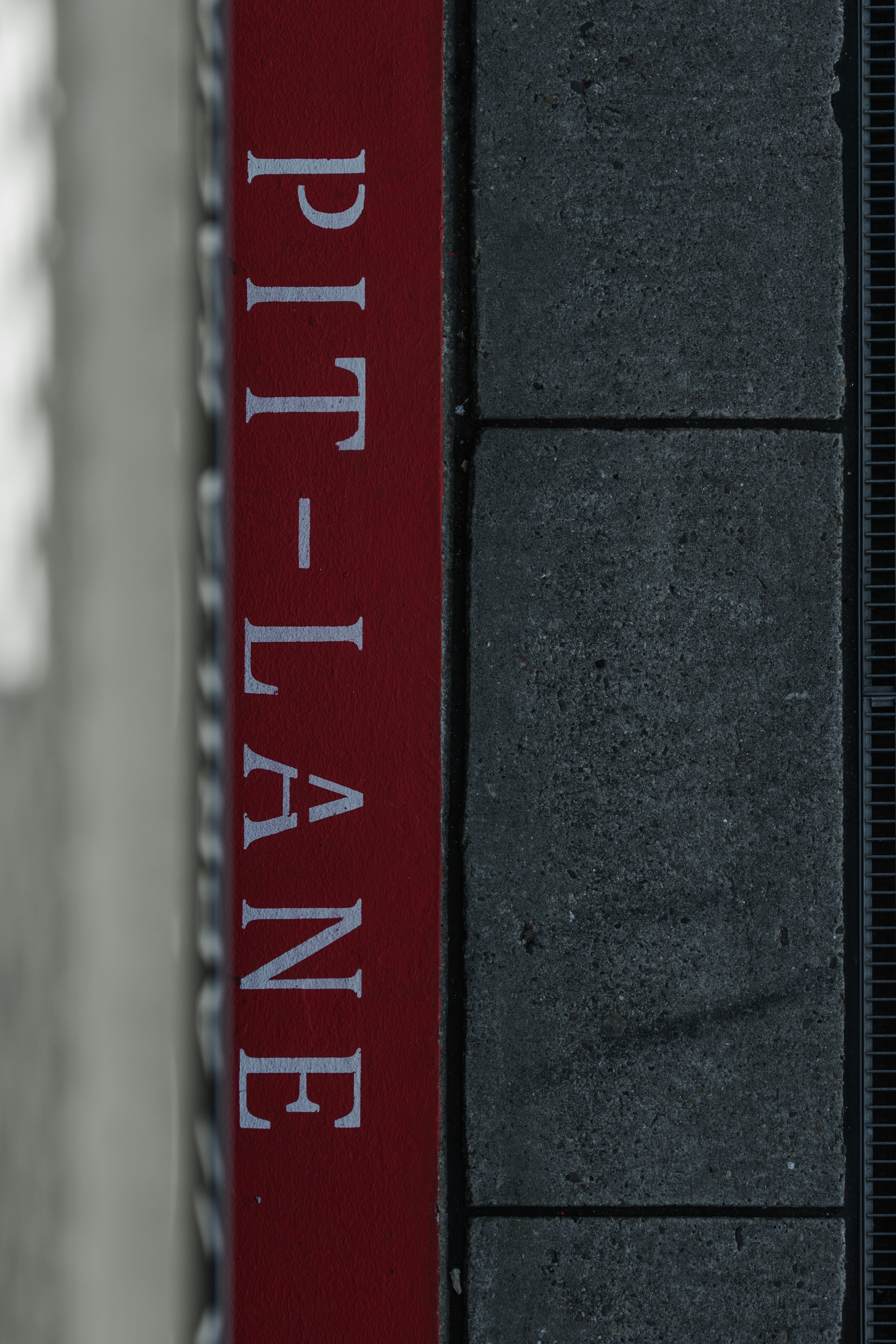 A red sign on a building that says pitt lane photo – Free Assen Image ...