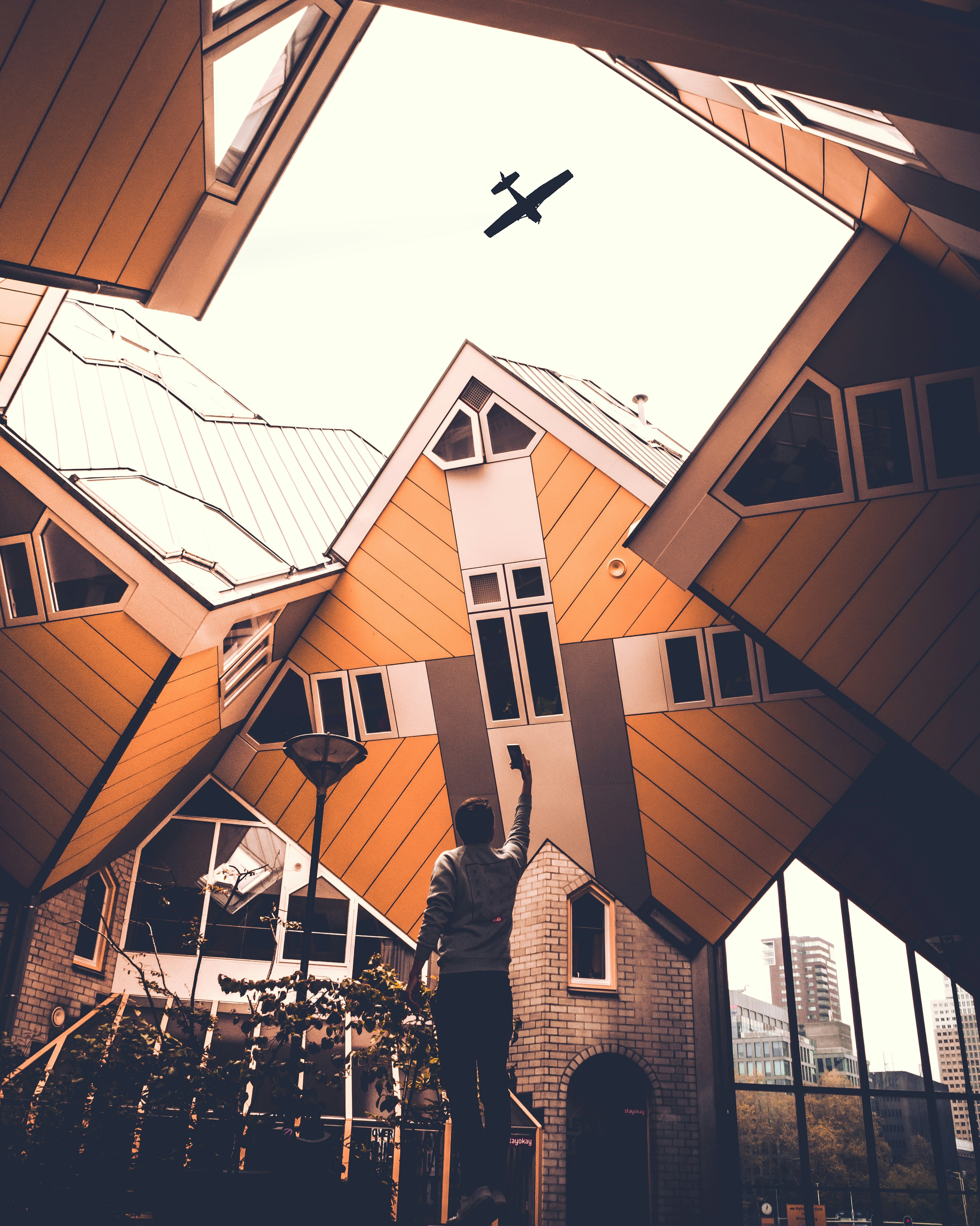 Concrete Cube Skies: A Painterly City of Orange Angles