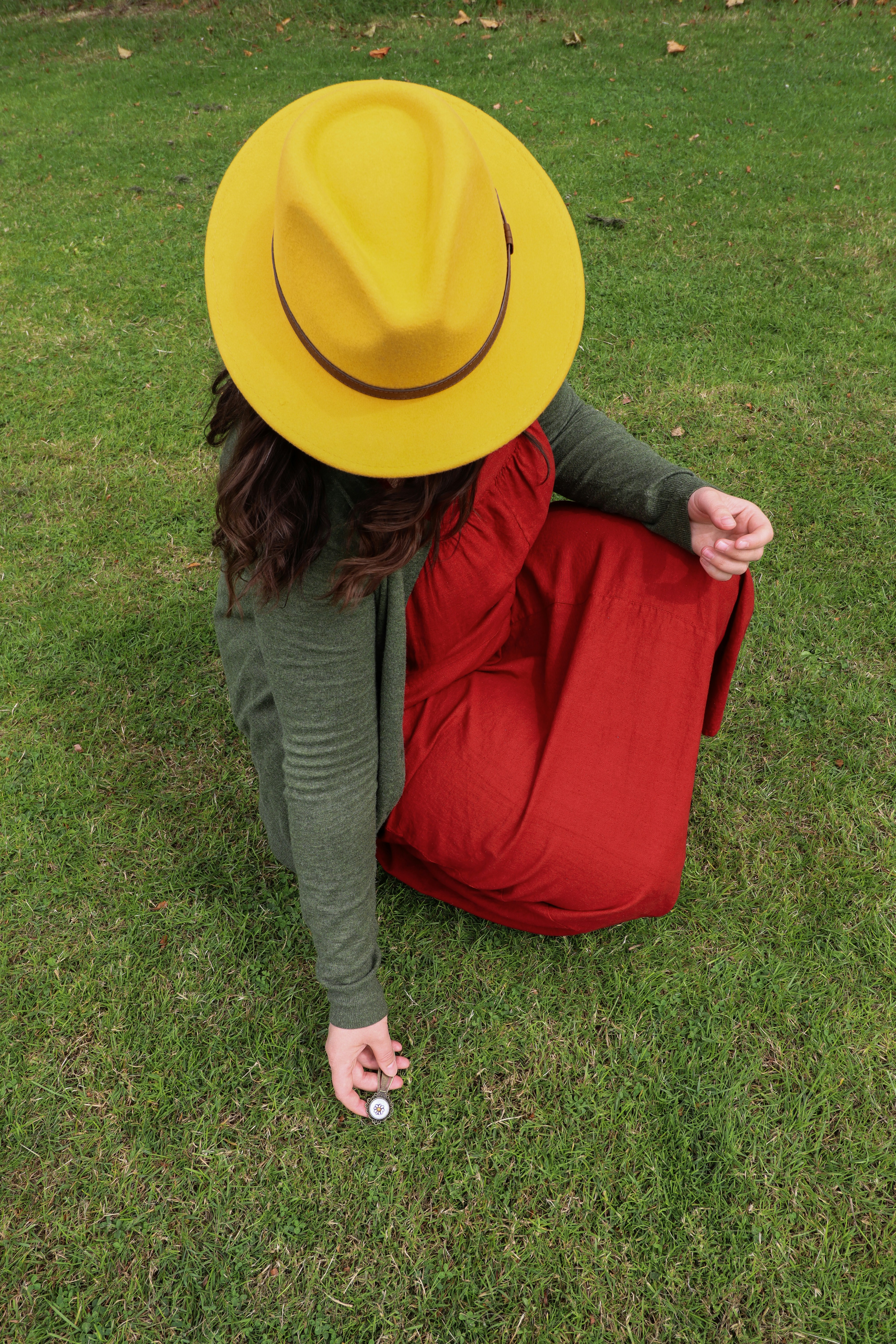 Lemon Halo, Crimson Dress: A Quiet Moment on the Park Lawn