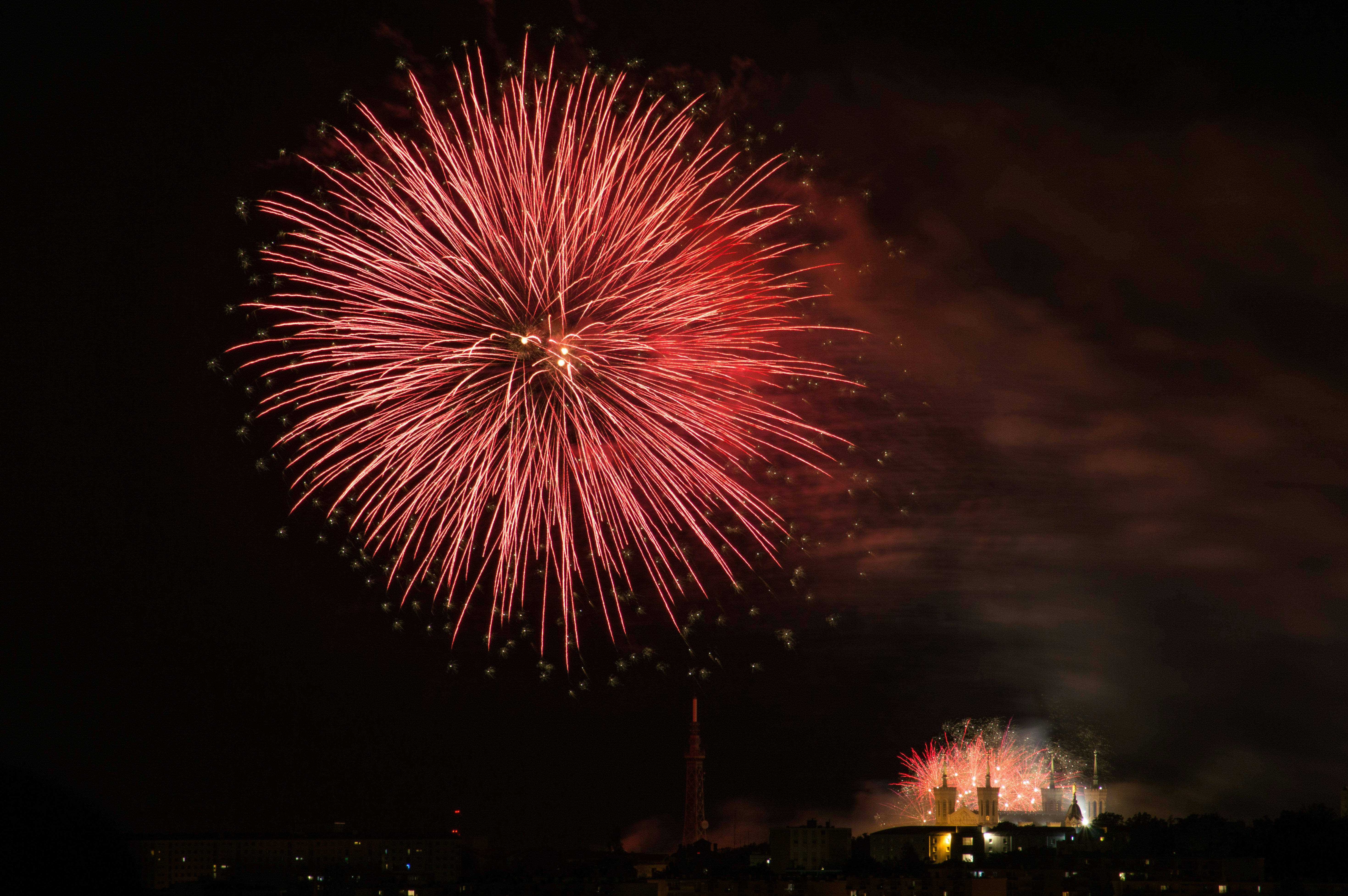 A firework display in the night sky over a city photo – Free Lyon Image ...