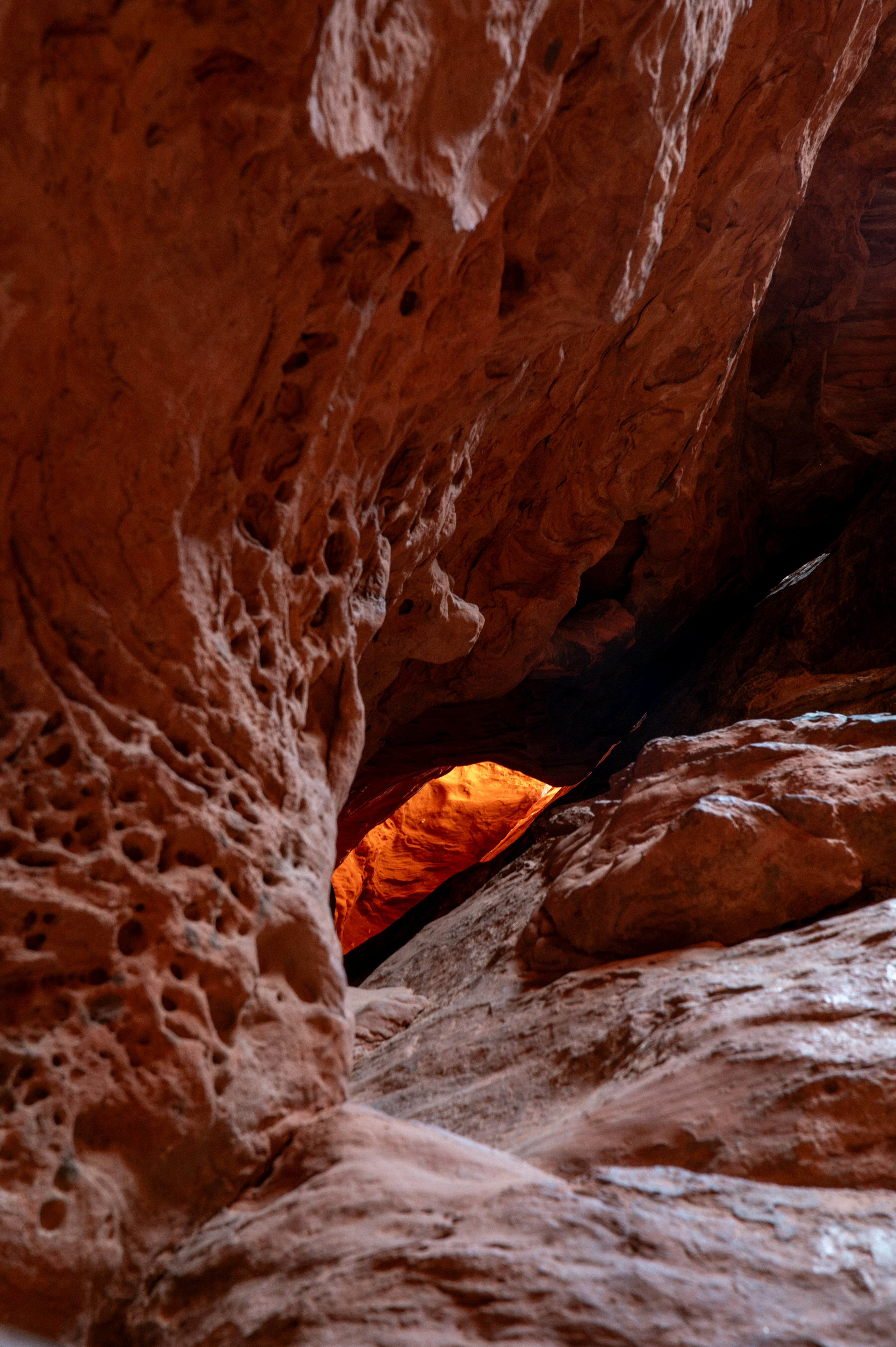 A cave filled with lots of red rocks photo – Free Nature Image on Unsplash
