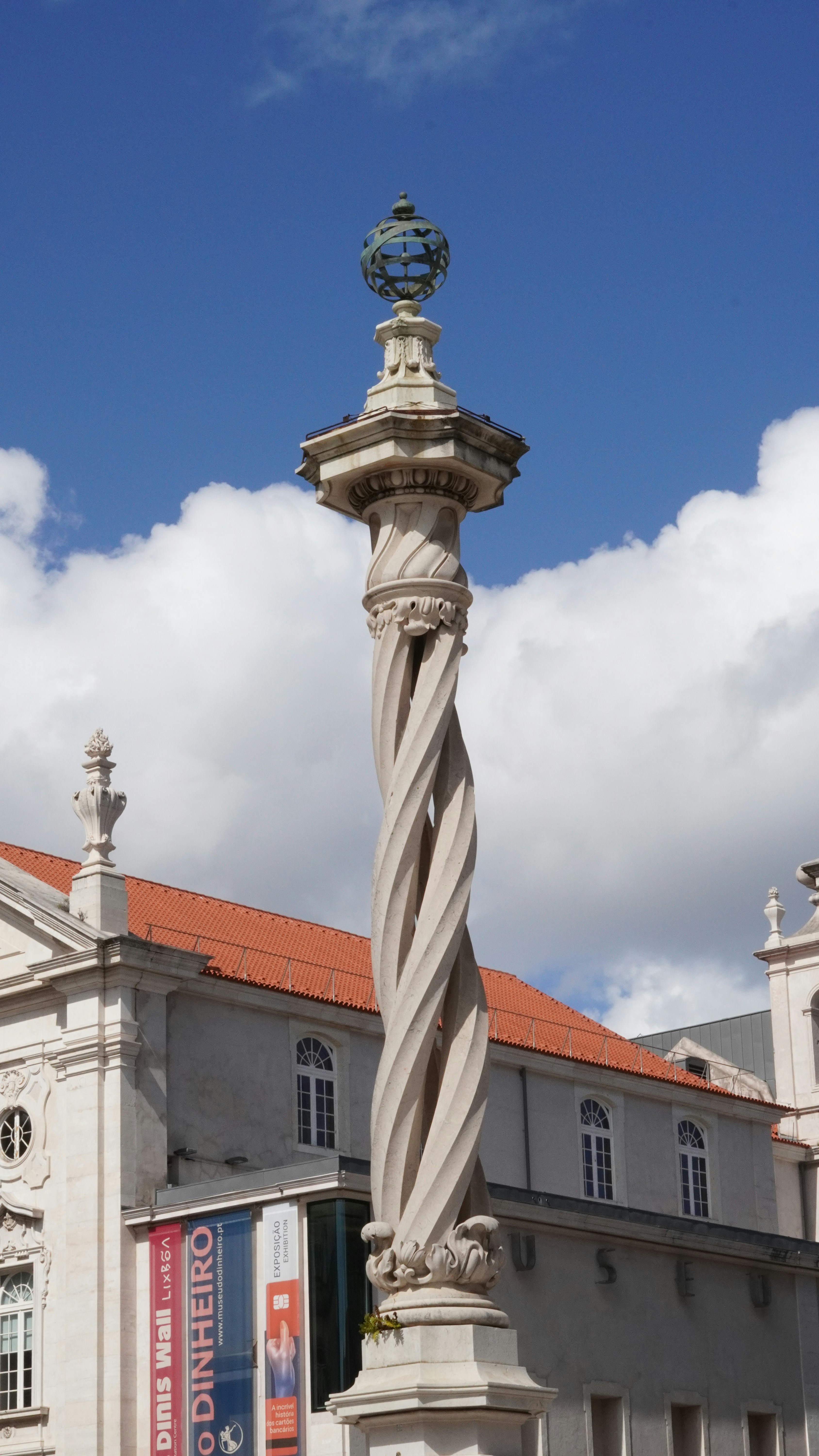 The Helical Column and Globe Finial: A Quiet Monument Under Azure Sky