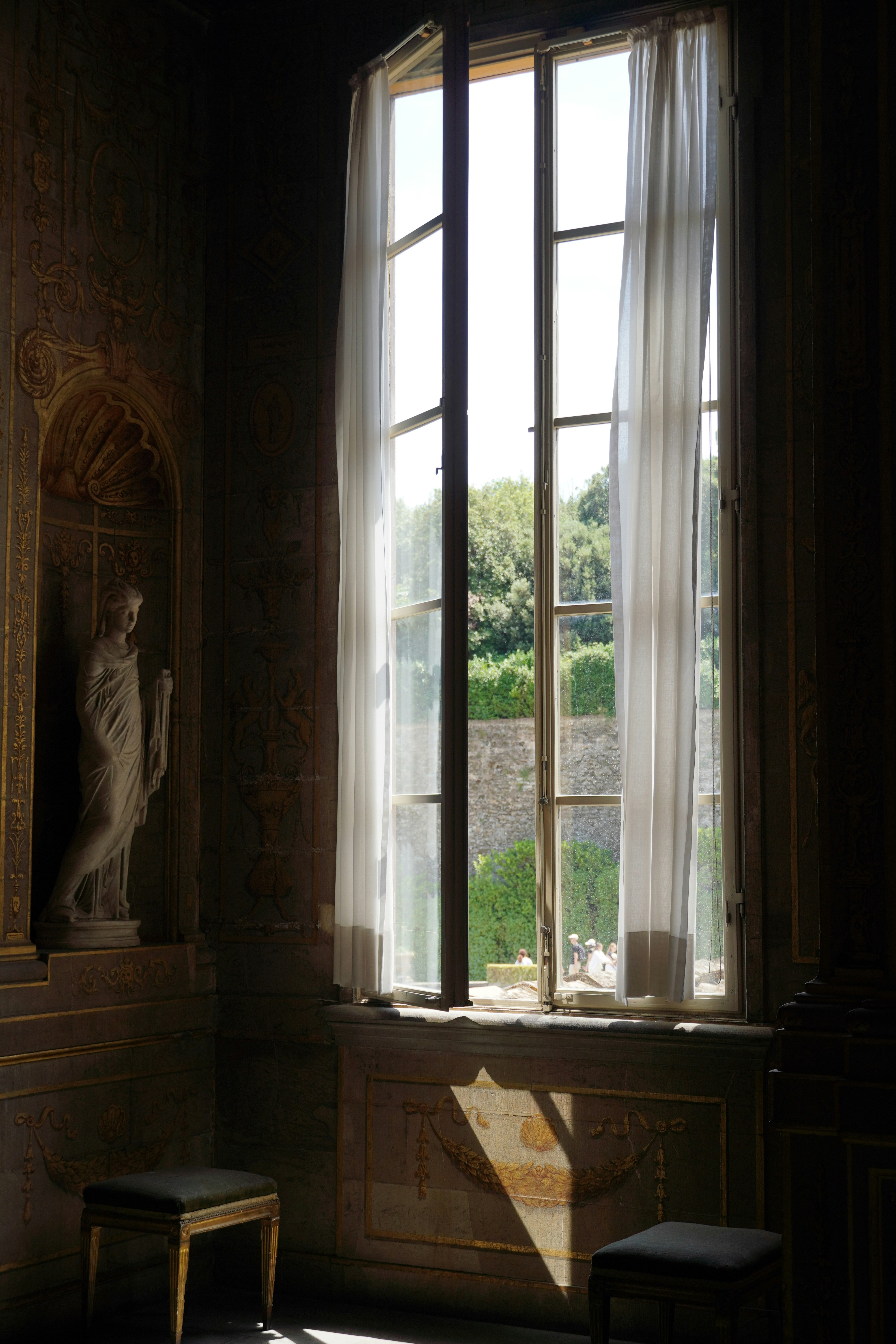 A room with a large window and a statue photo – Free Florence Image on ...