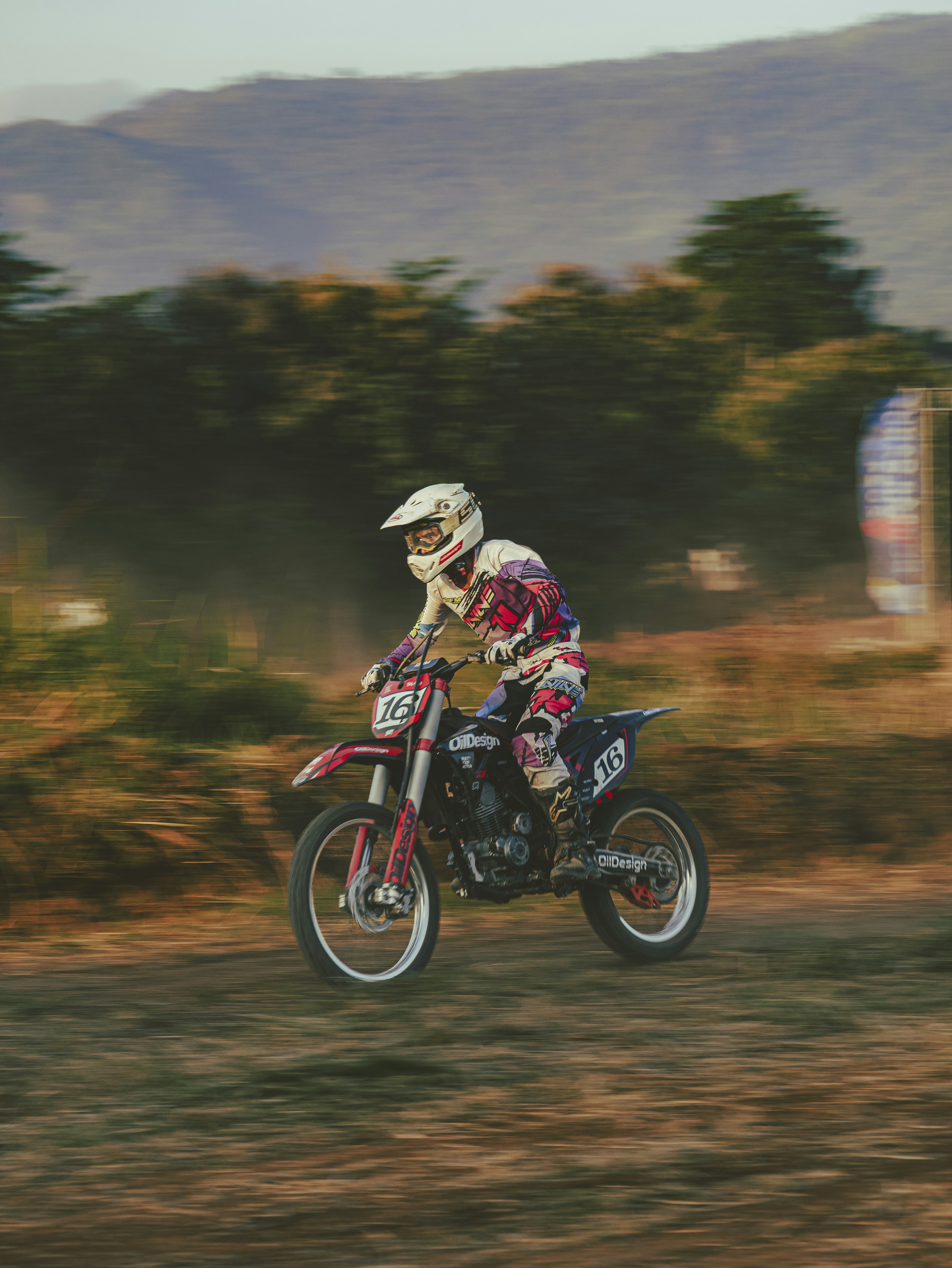 A person riding a dirt bike on a dirt road photo – Free West java Image ...